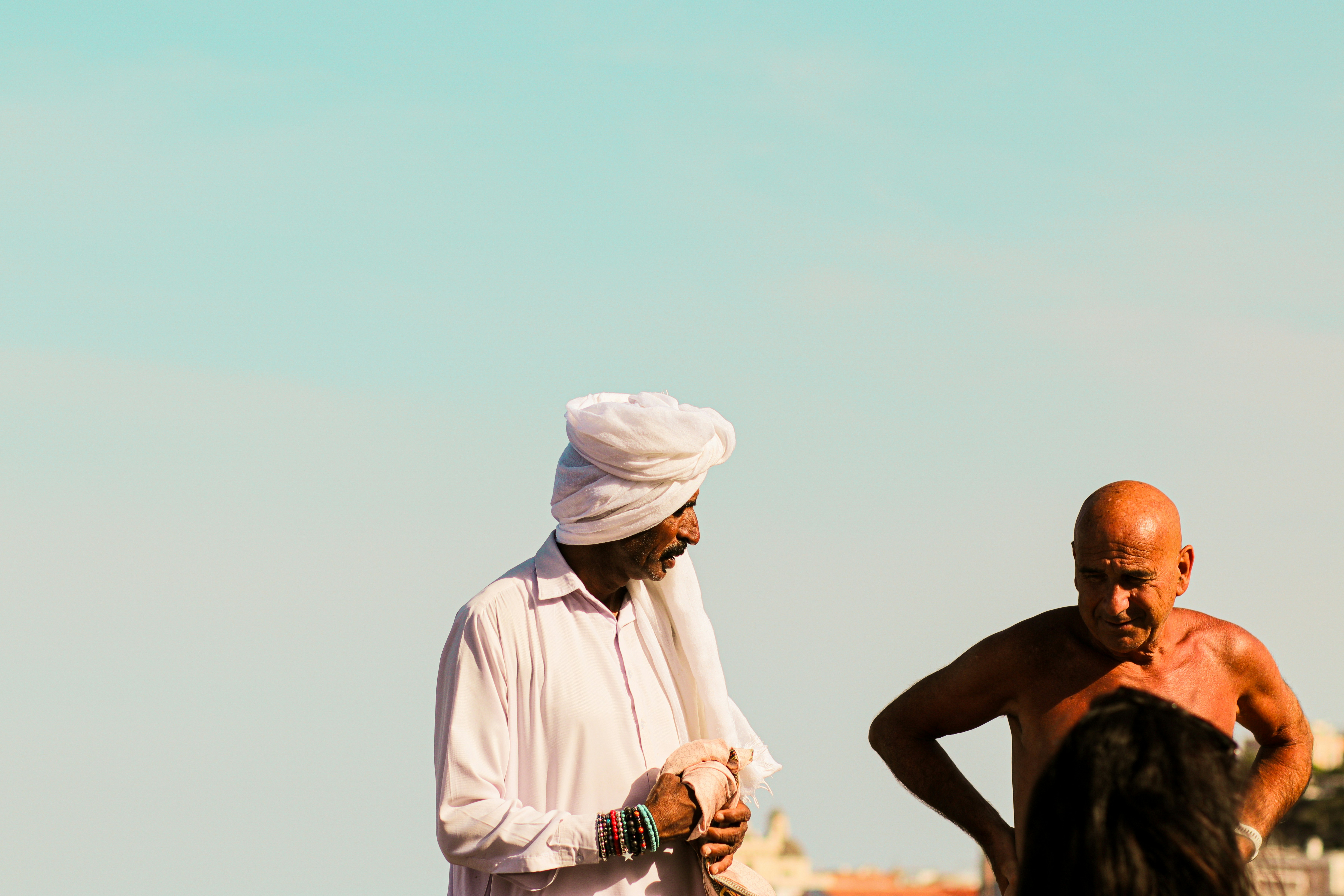 A couple of men standing next to each other