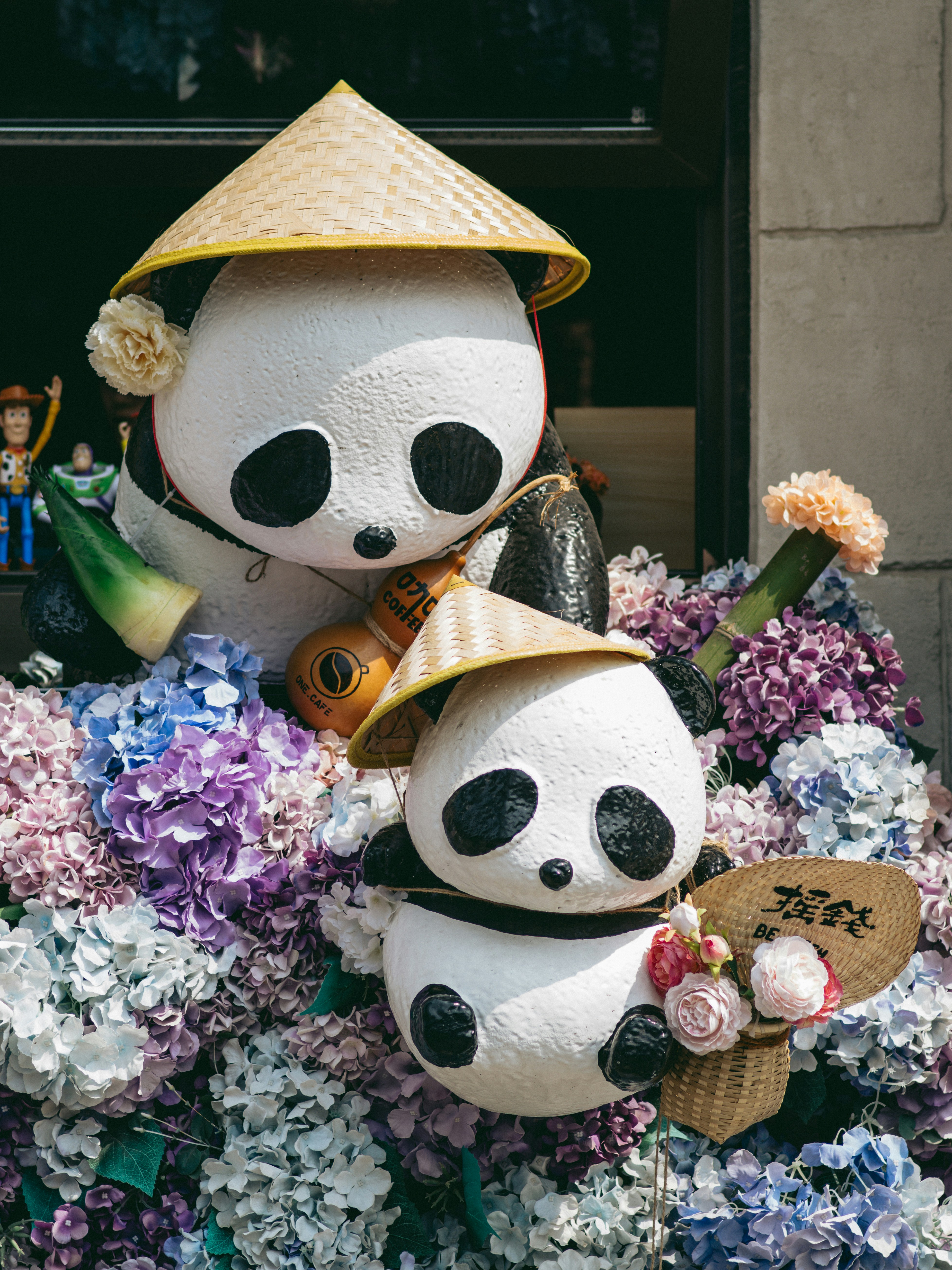 Pastel Hydrangea Parade: Twin Pandas in Straw Hats