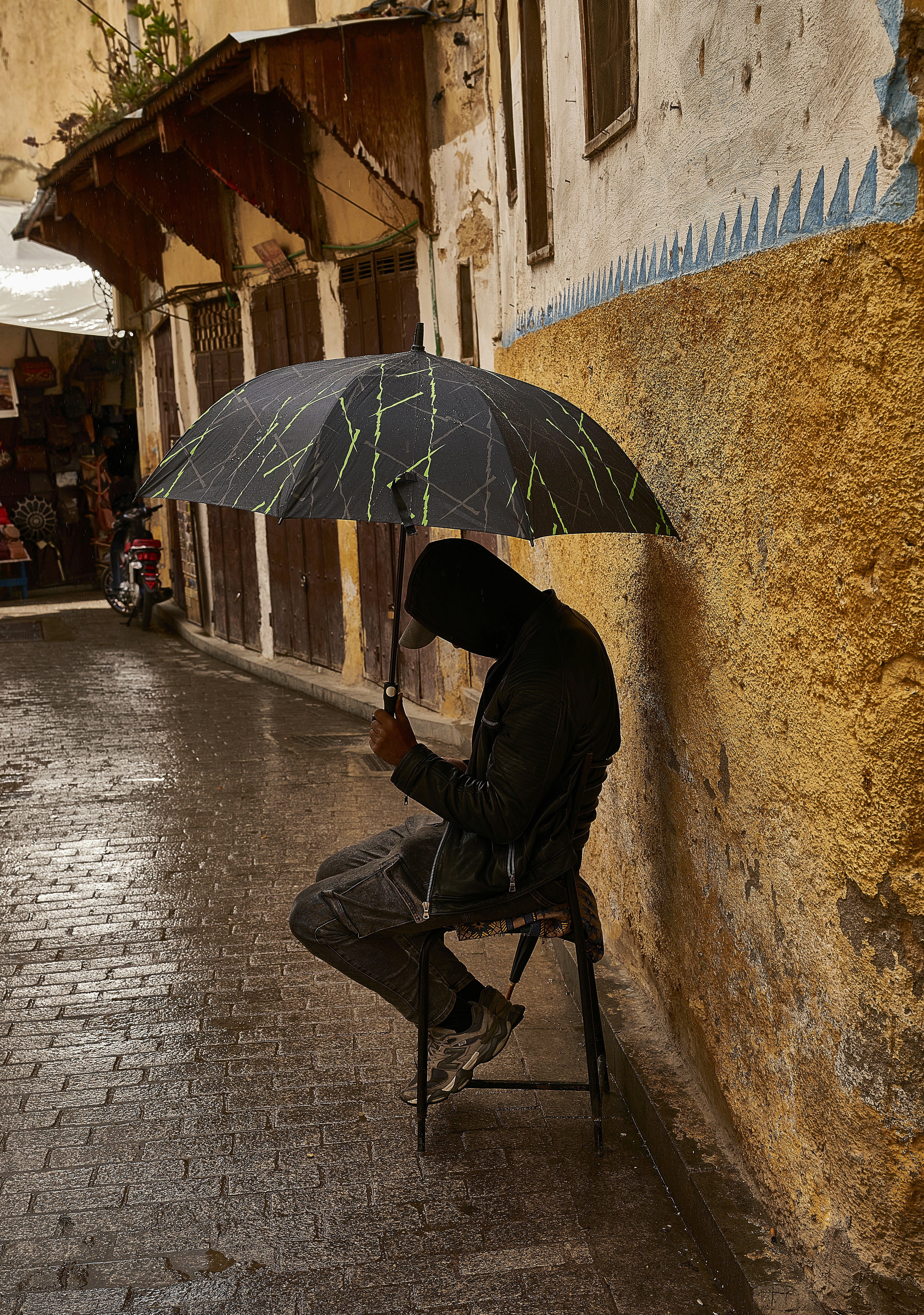 Neon-veined Umbrella in a Rain-Slick Alley