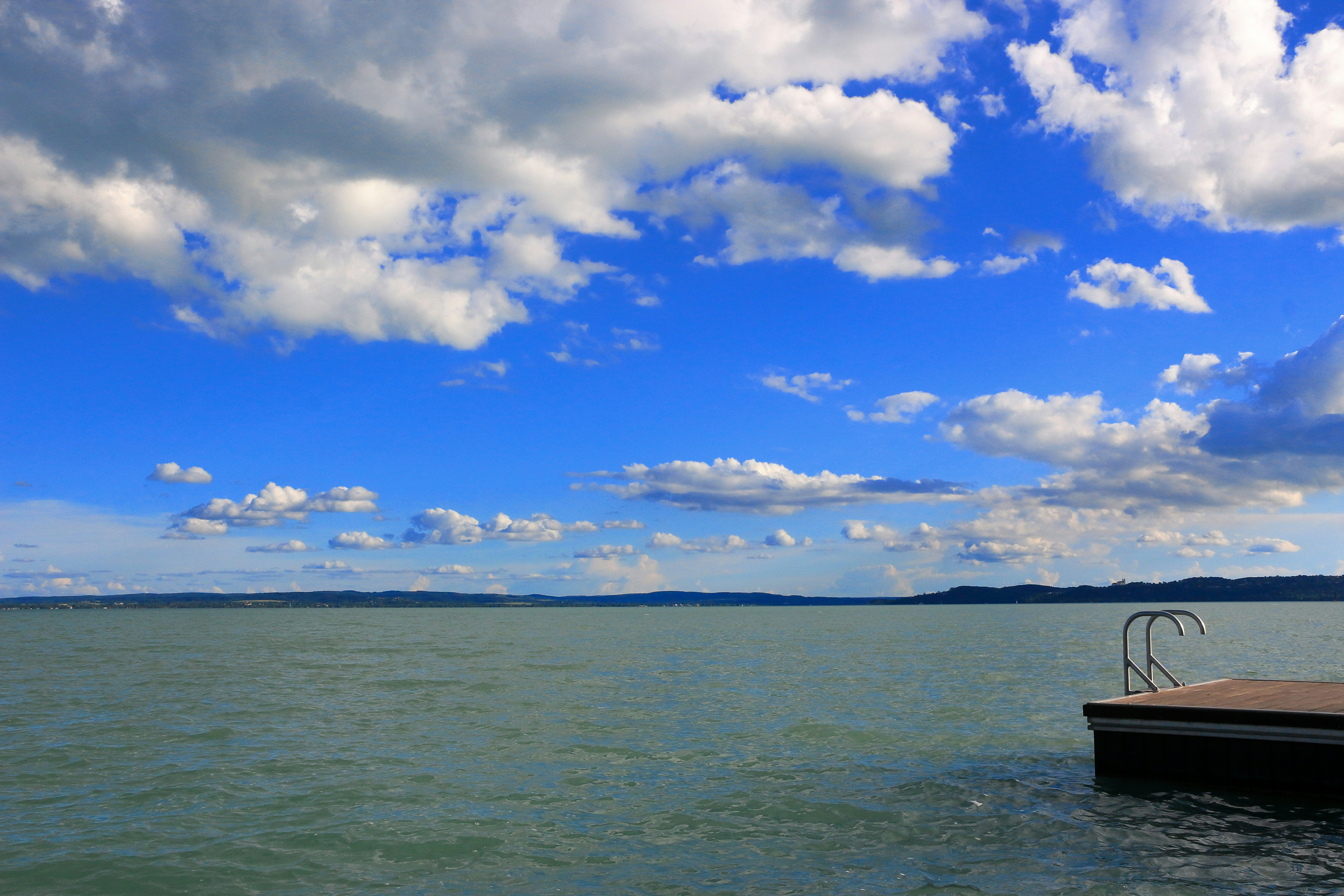 Dock at the Blue Horizon: A Quiet Lakeside Portrait