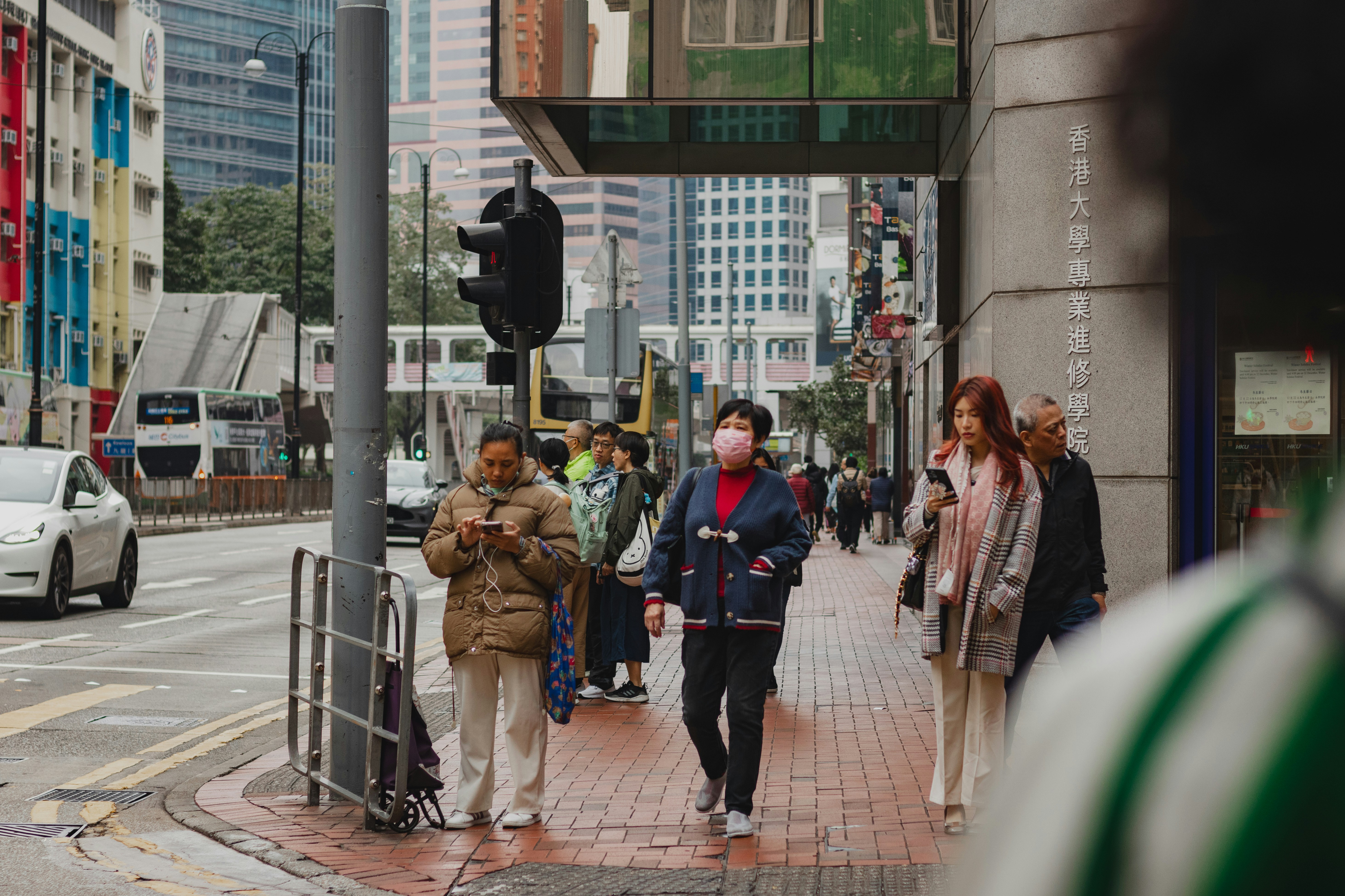Sidewalk Confluence: Everyday Moments Under a City Arcade