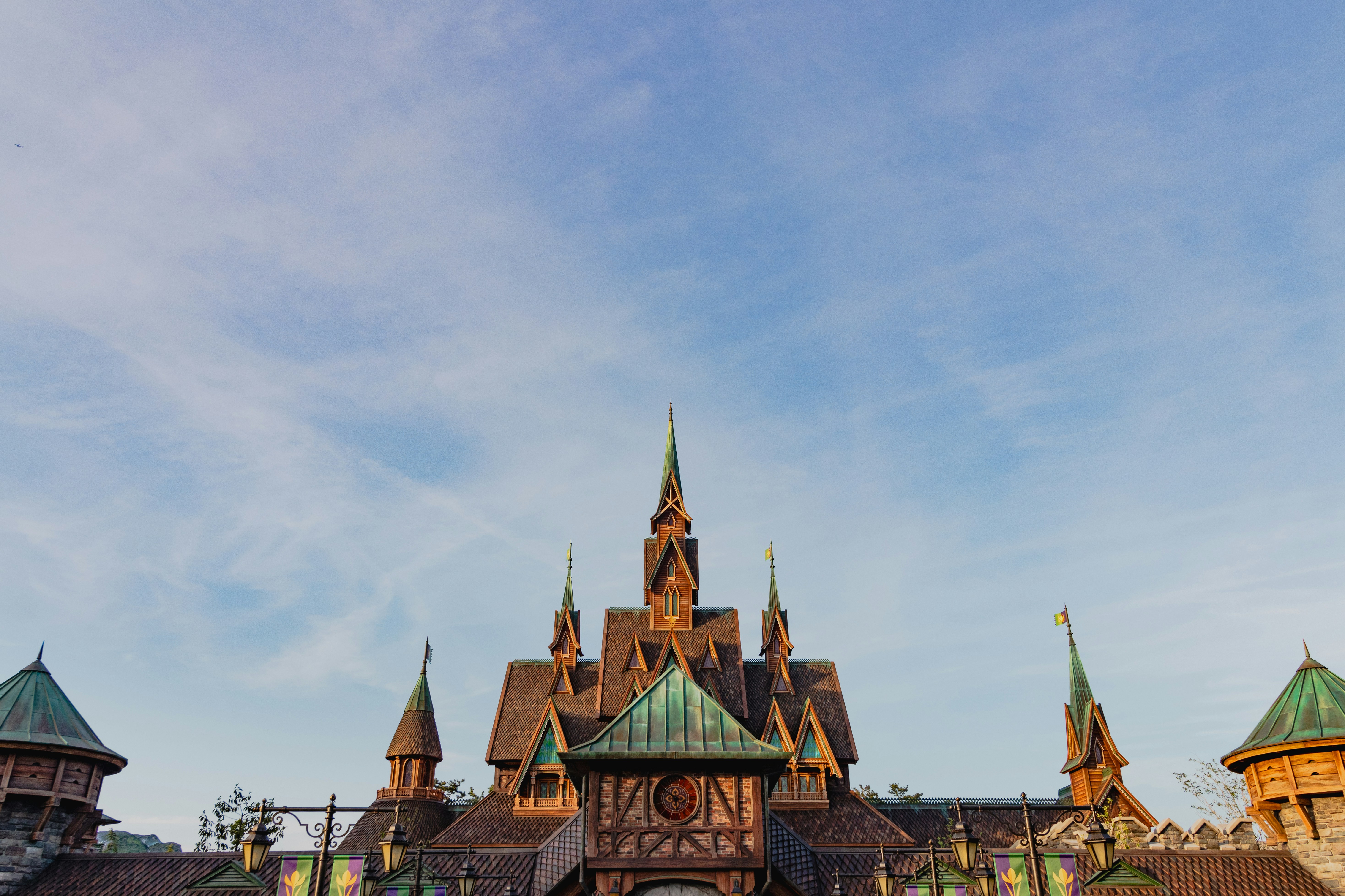 Central Spire of a Fairytale Fortress under a Clear Blue Sky