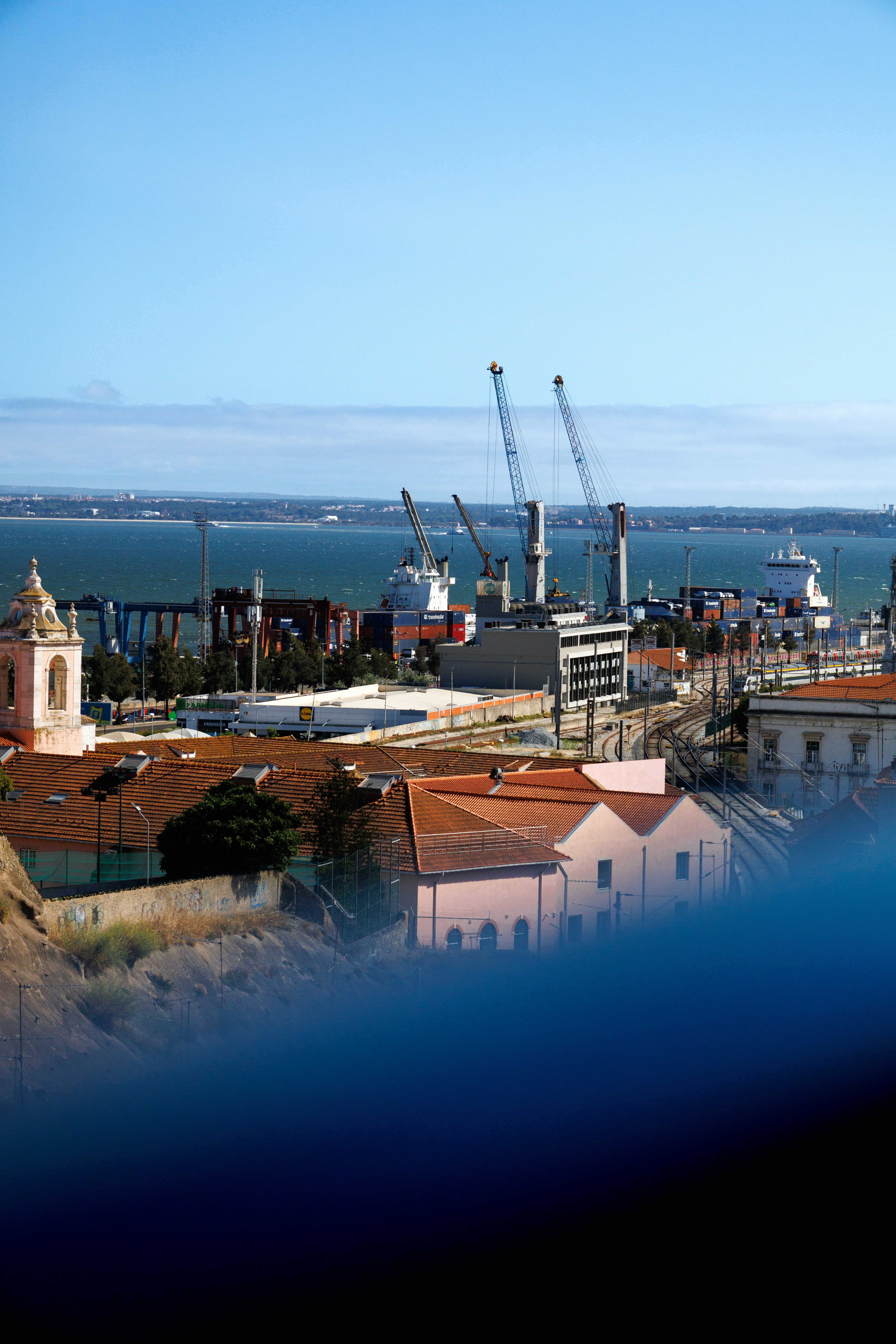 Cranes Over the Quiet Port: A Coastal Industrial Mosaic