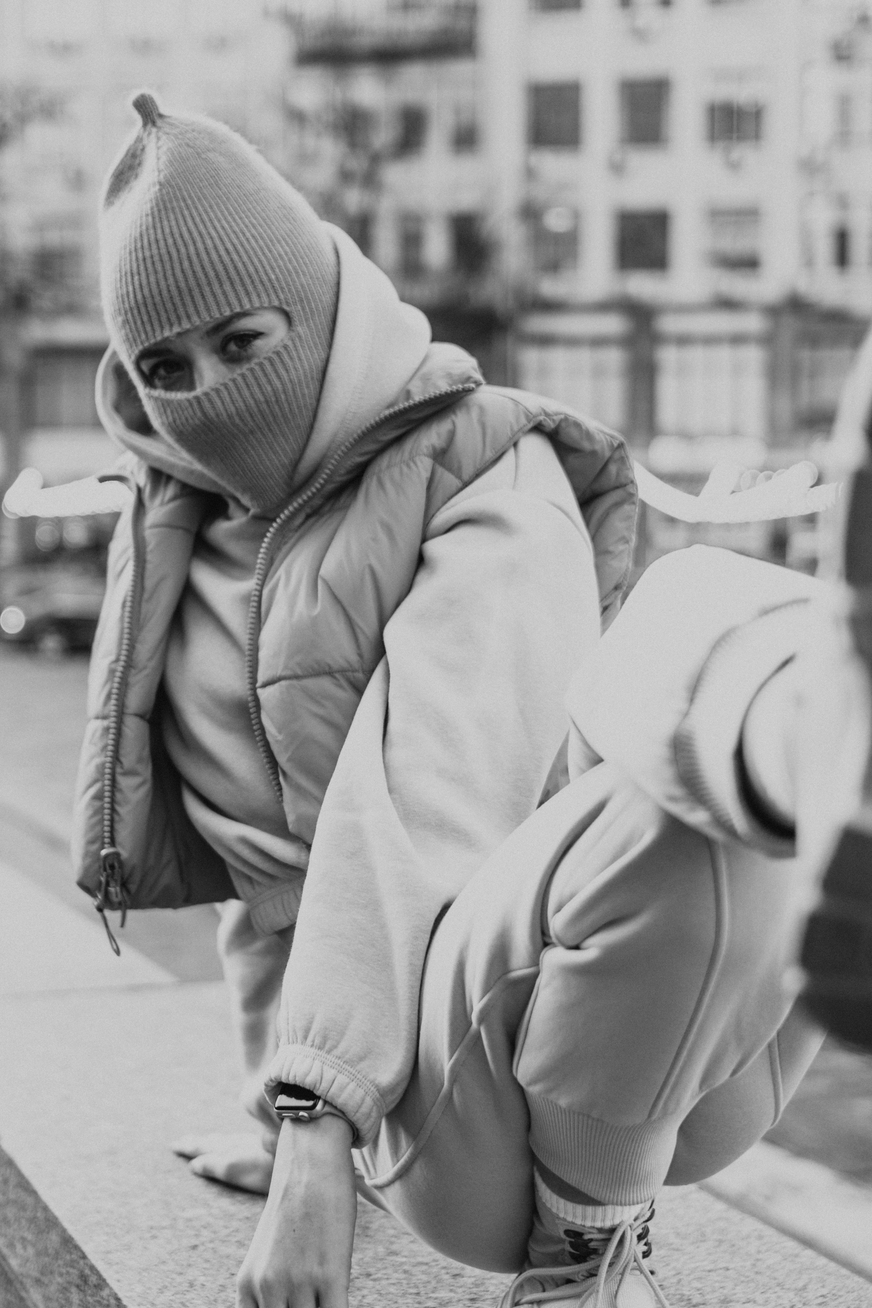 Masked Street Surfer in a City Frost