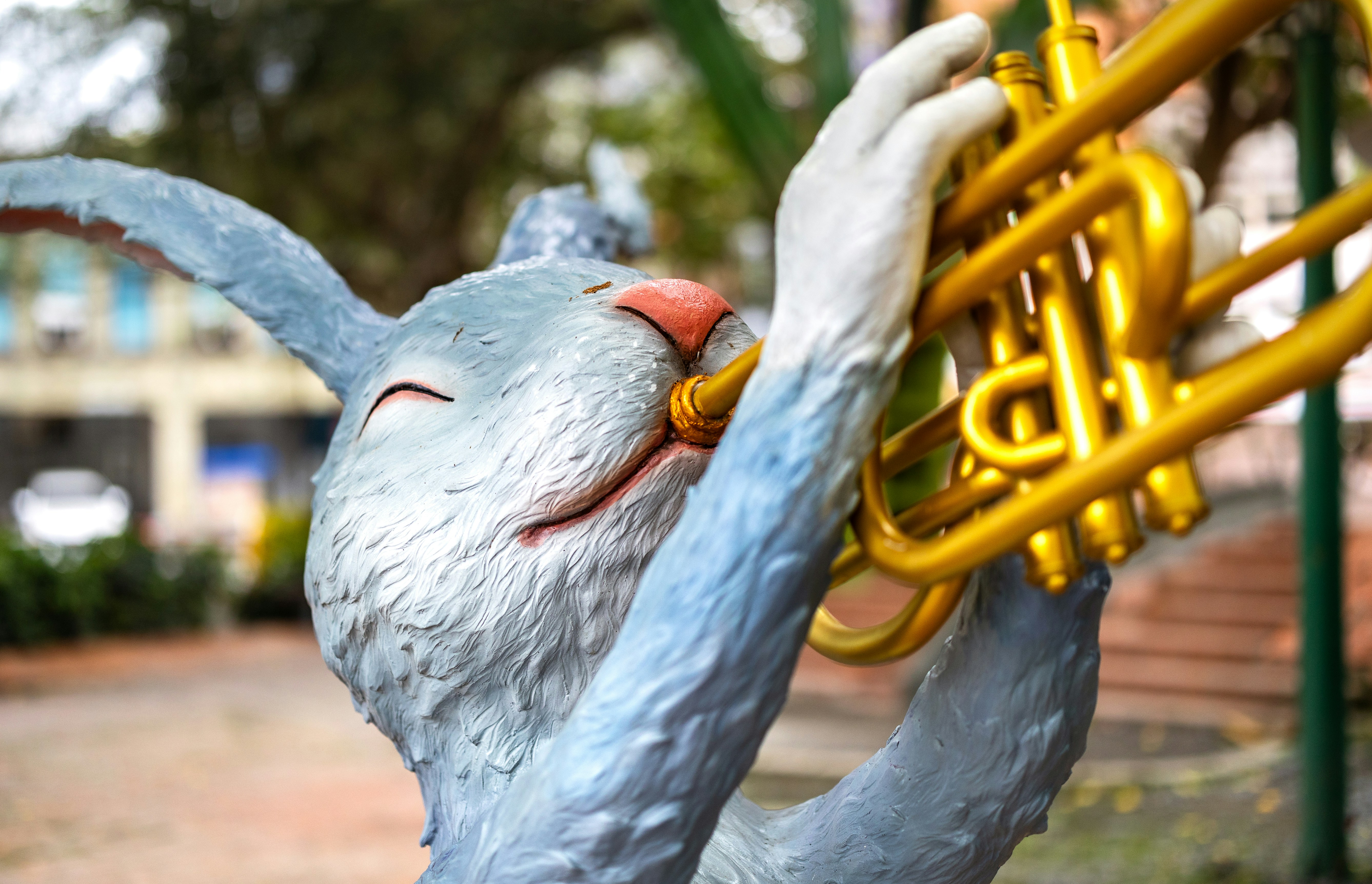 A statue of a rabbit playing a trumpet photo – Free Taiwan Image on ...