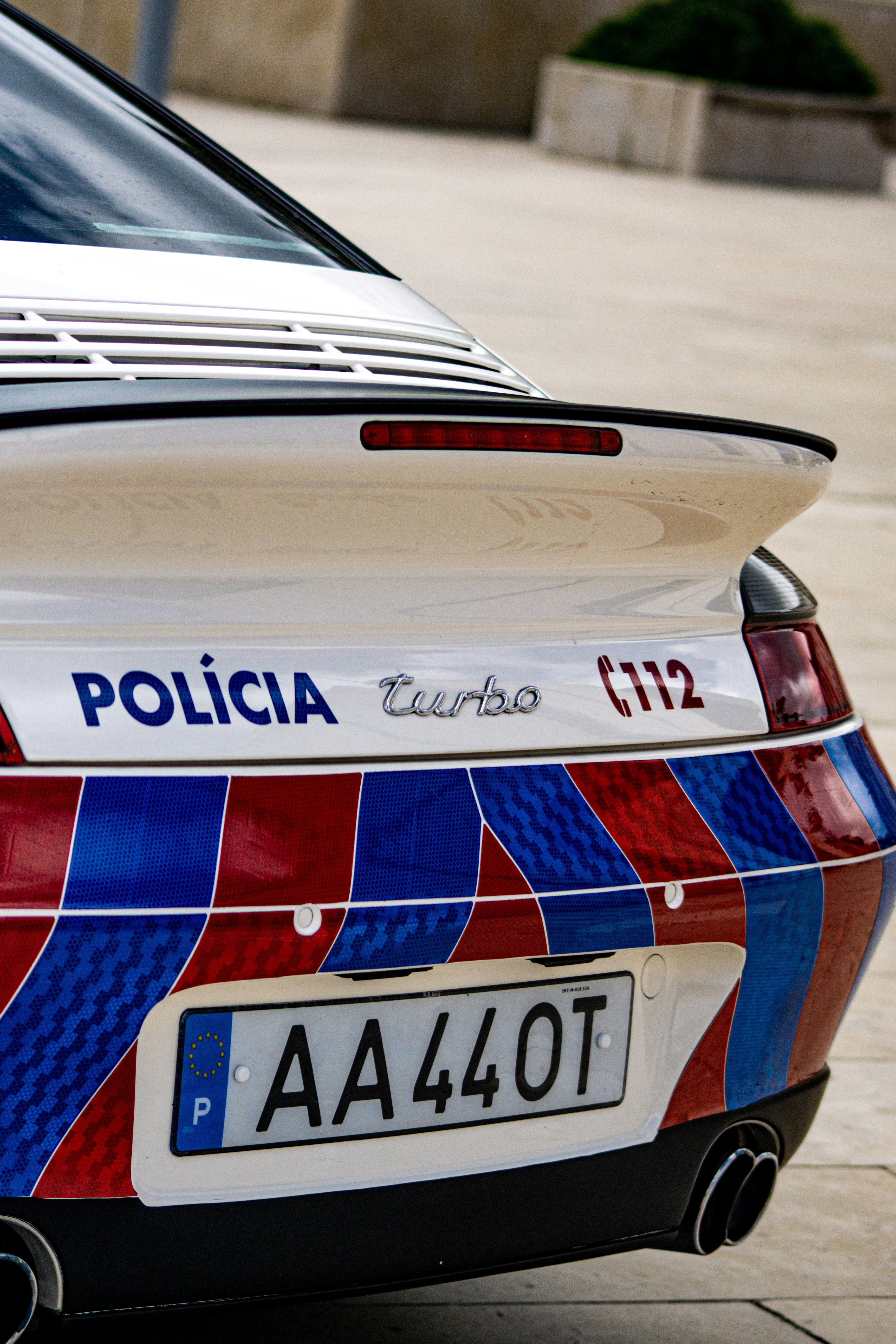 Rear Guard: Policia Turbo with Checkerboard Livery and EU Plate