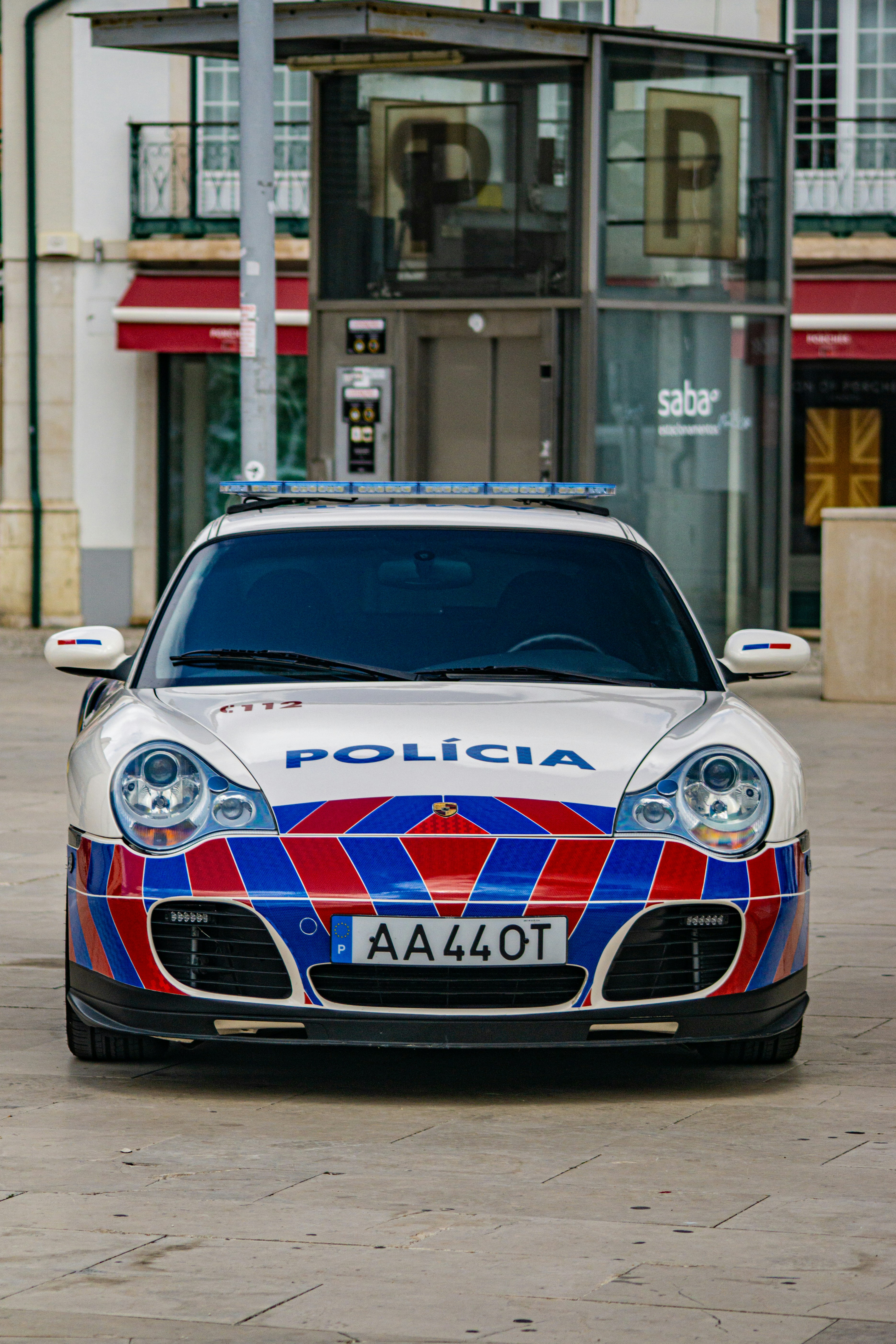 Front and Flag: A Police Car Anchors the City Square