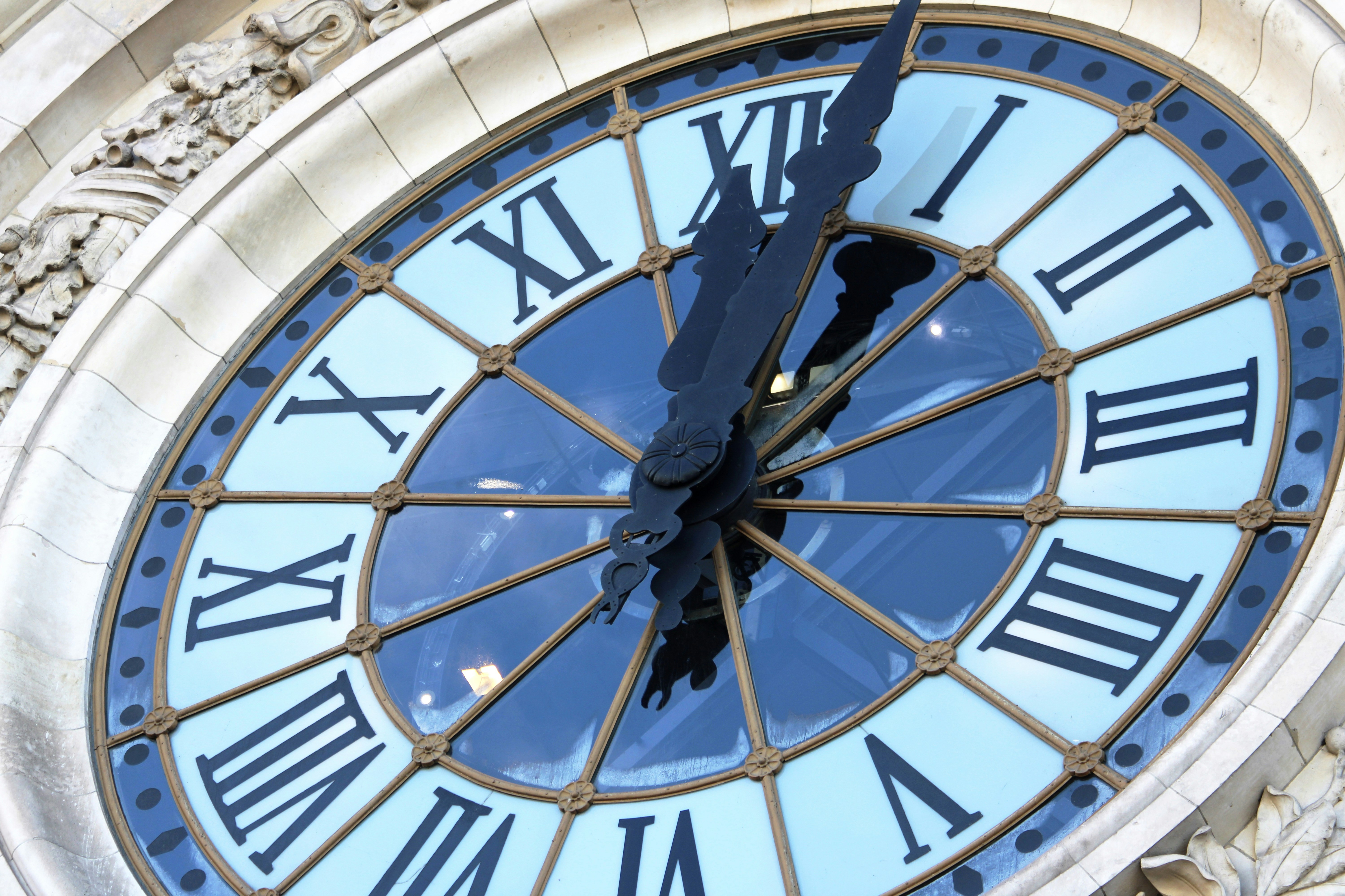 A large clock on the side of a building photo – Free Clock Image on ...