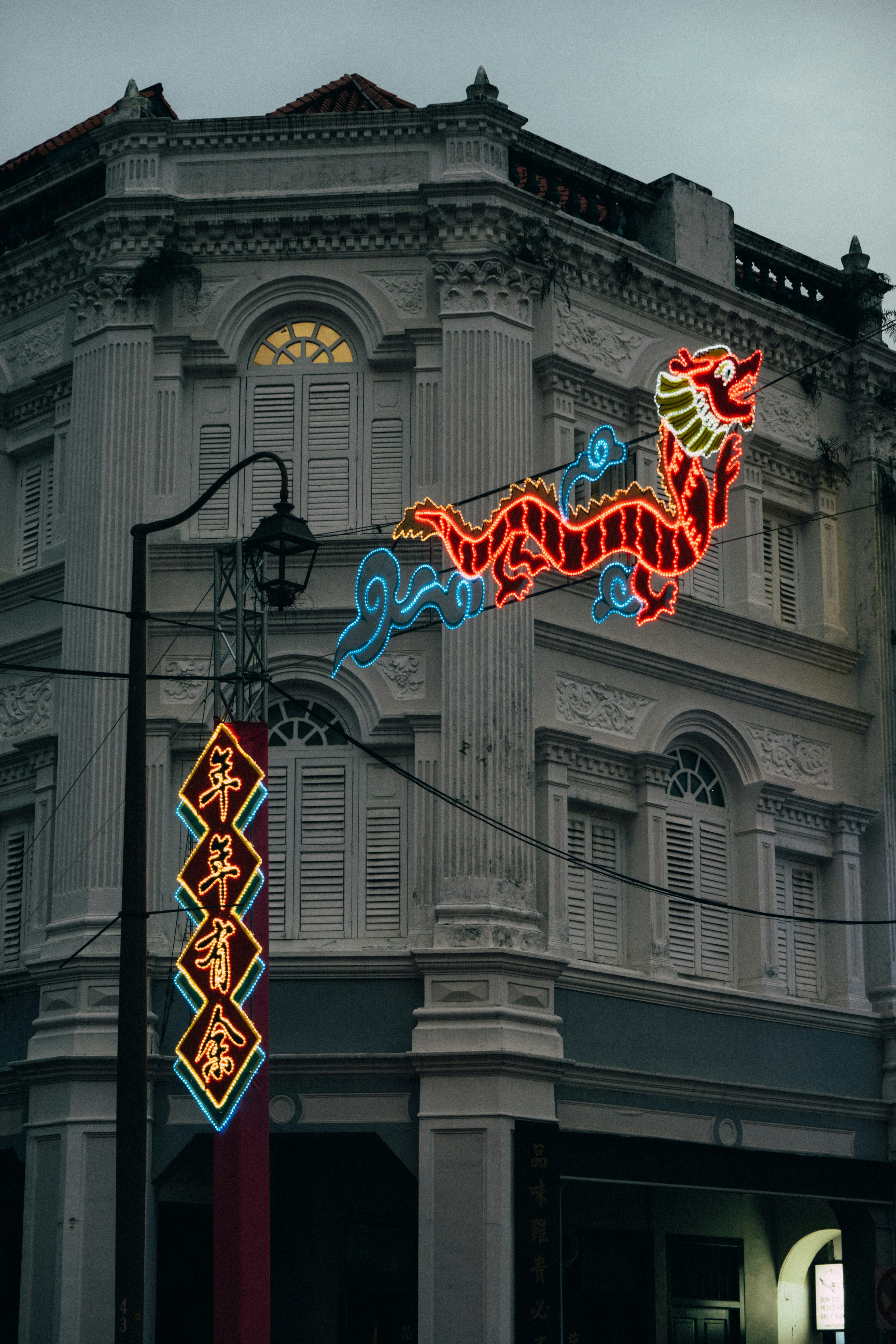 Neon Dragon Over the Facade