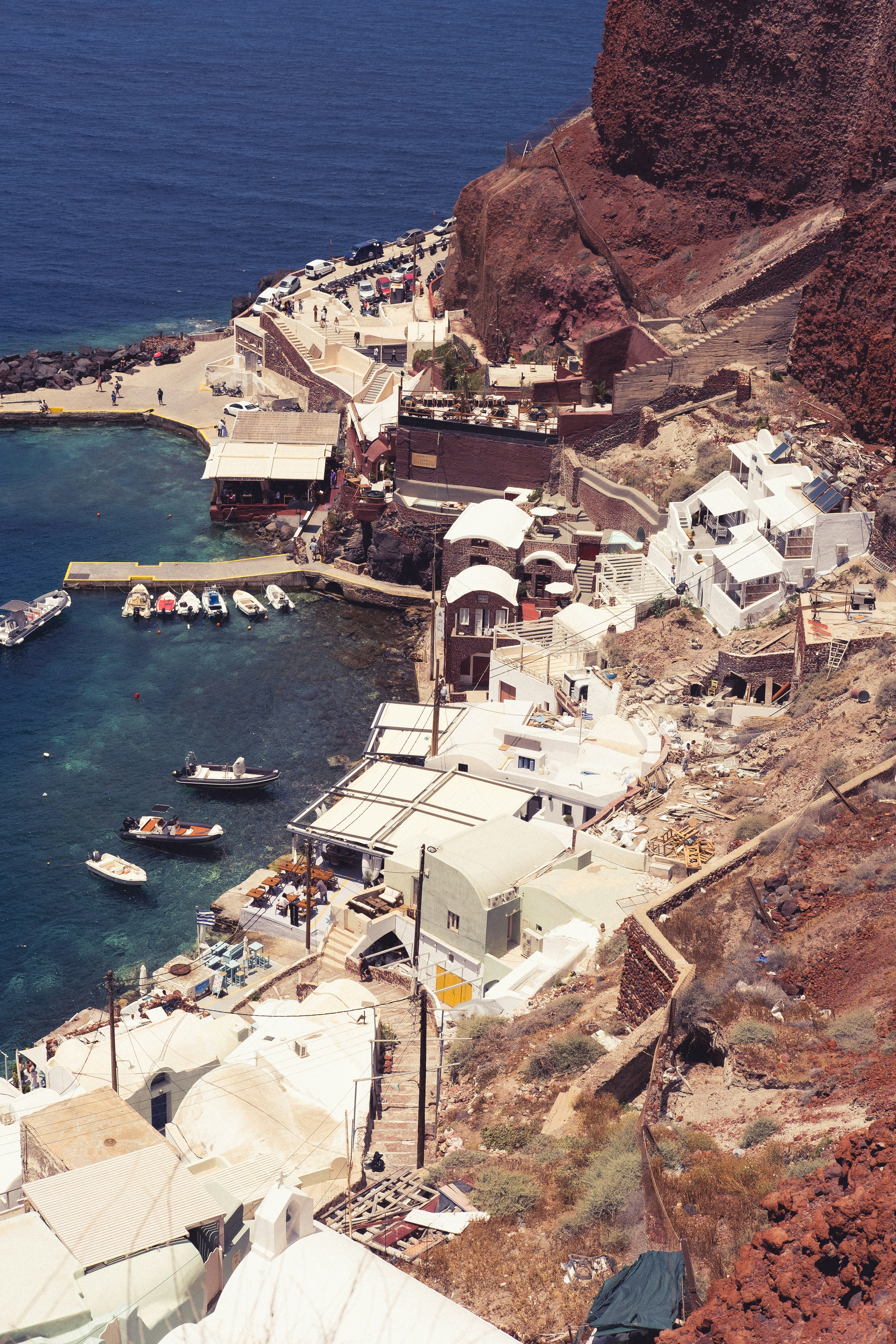 Cliffside Whitewashed Village Unfurling Along a Turquoise Harbor