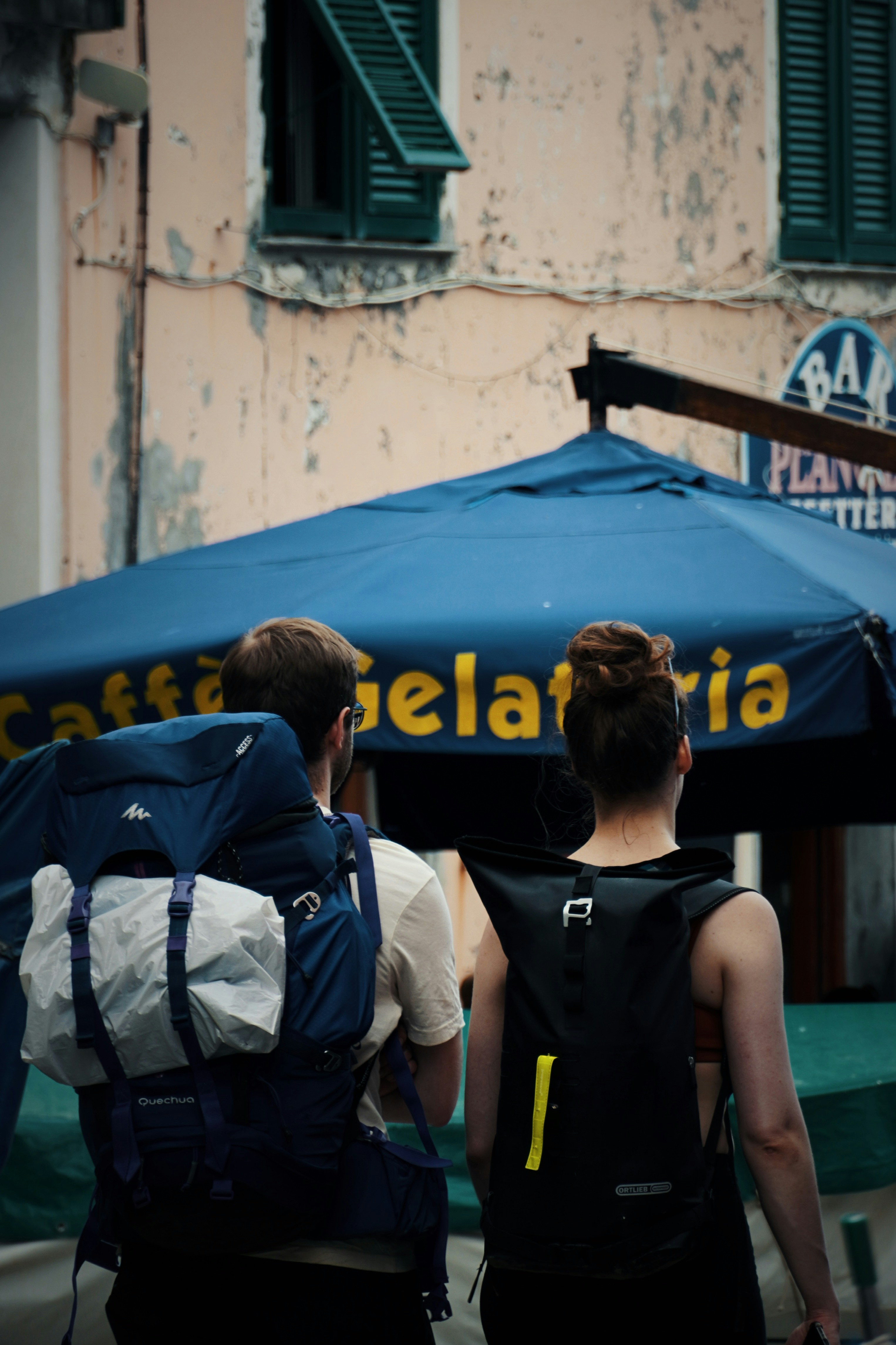 Under the Gelateria Canopy: Backpackers in a City Moment