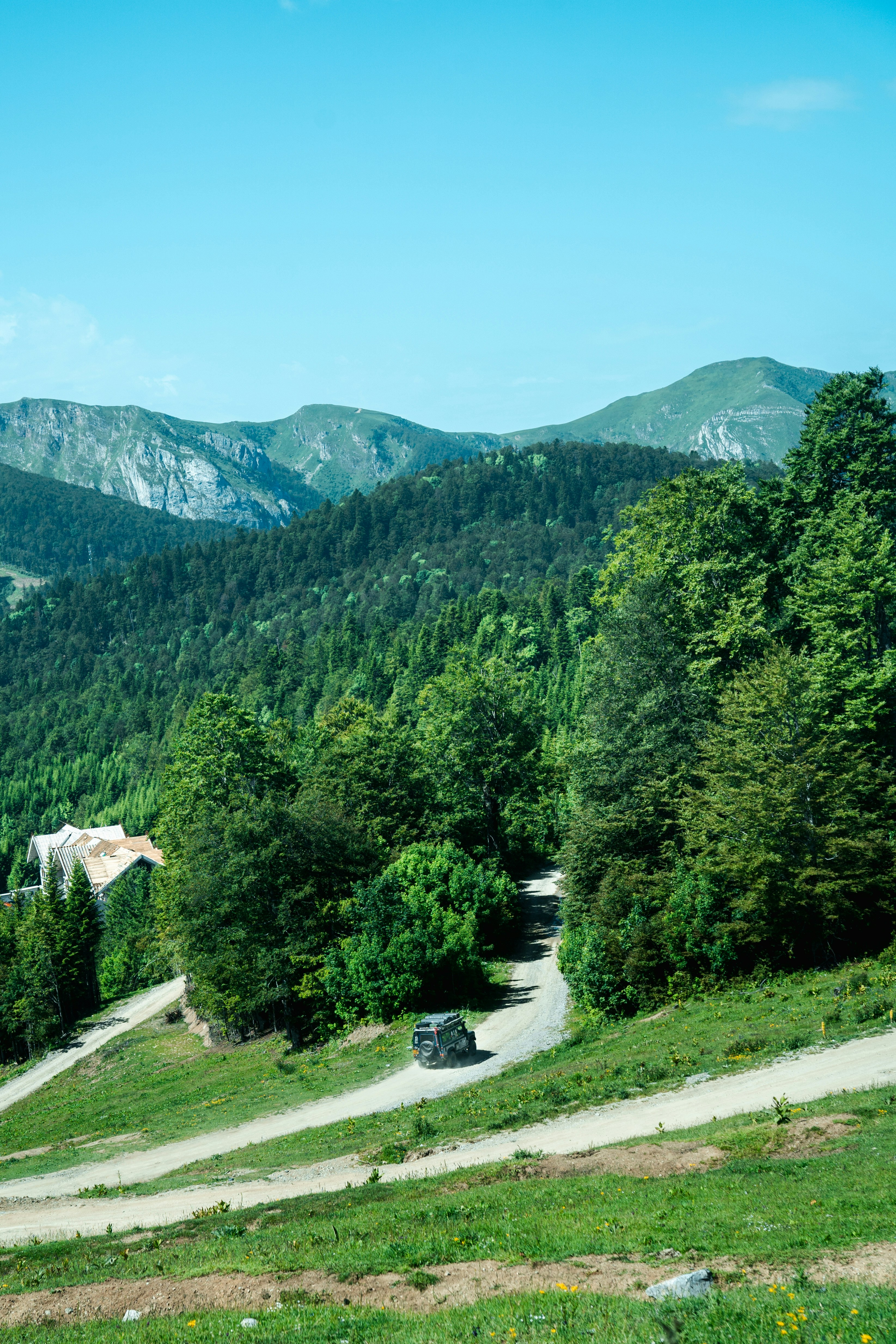A scenic view of a mountain with a winding road photo – Free Montenegro ...