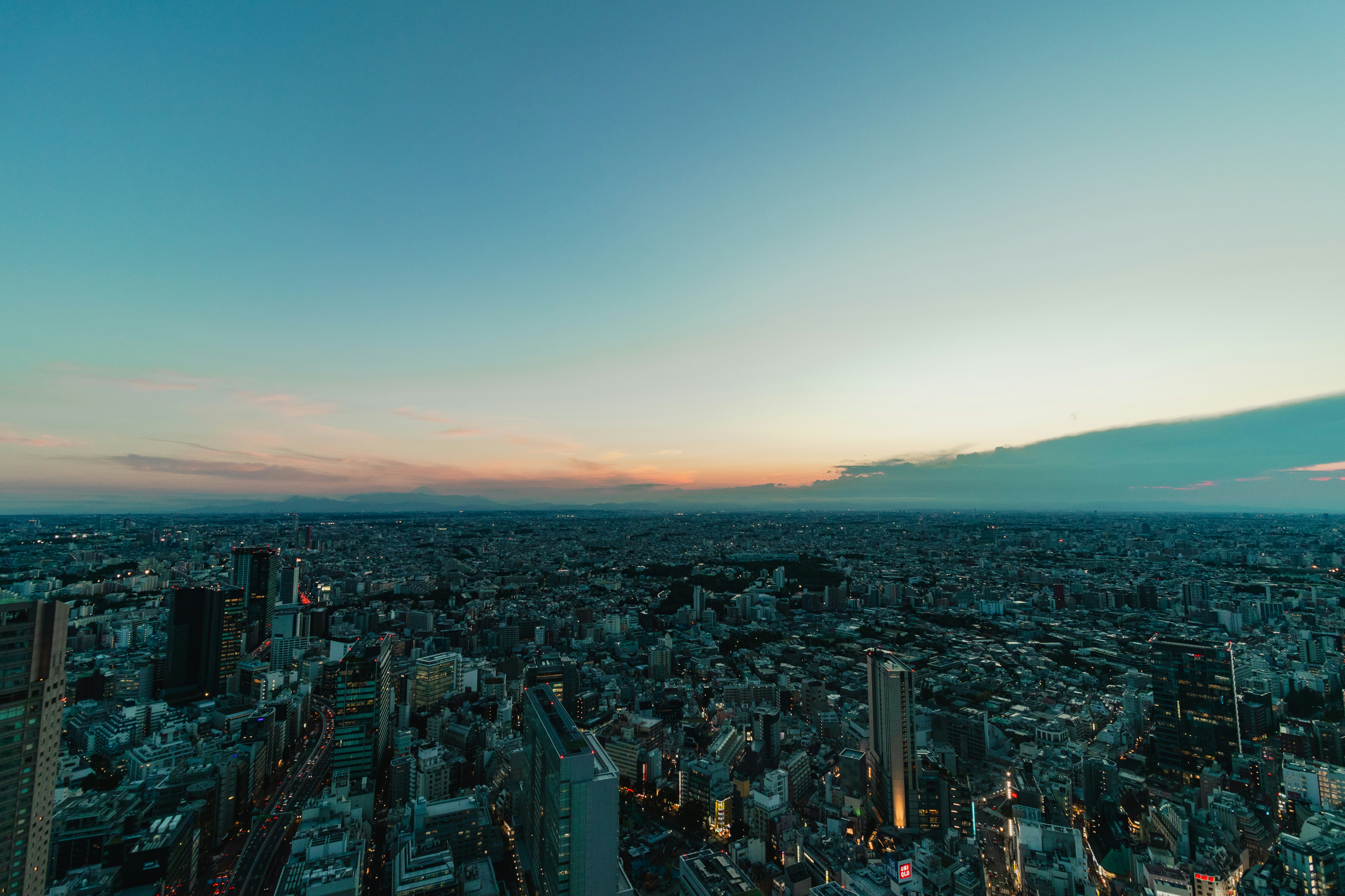 A panoramic view of a city at sunset photo – Free City Image on Unsplash
