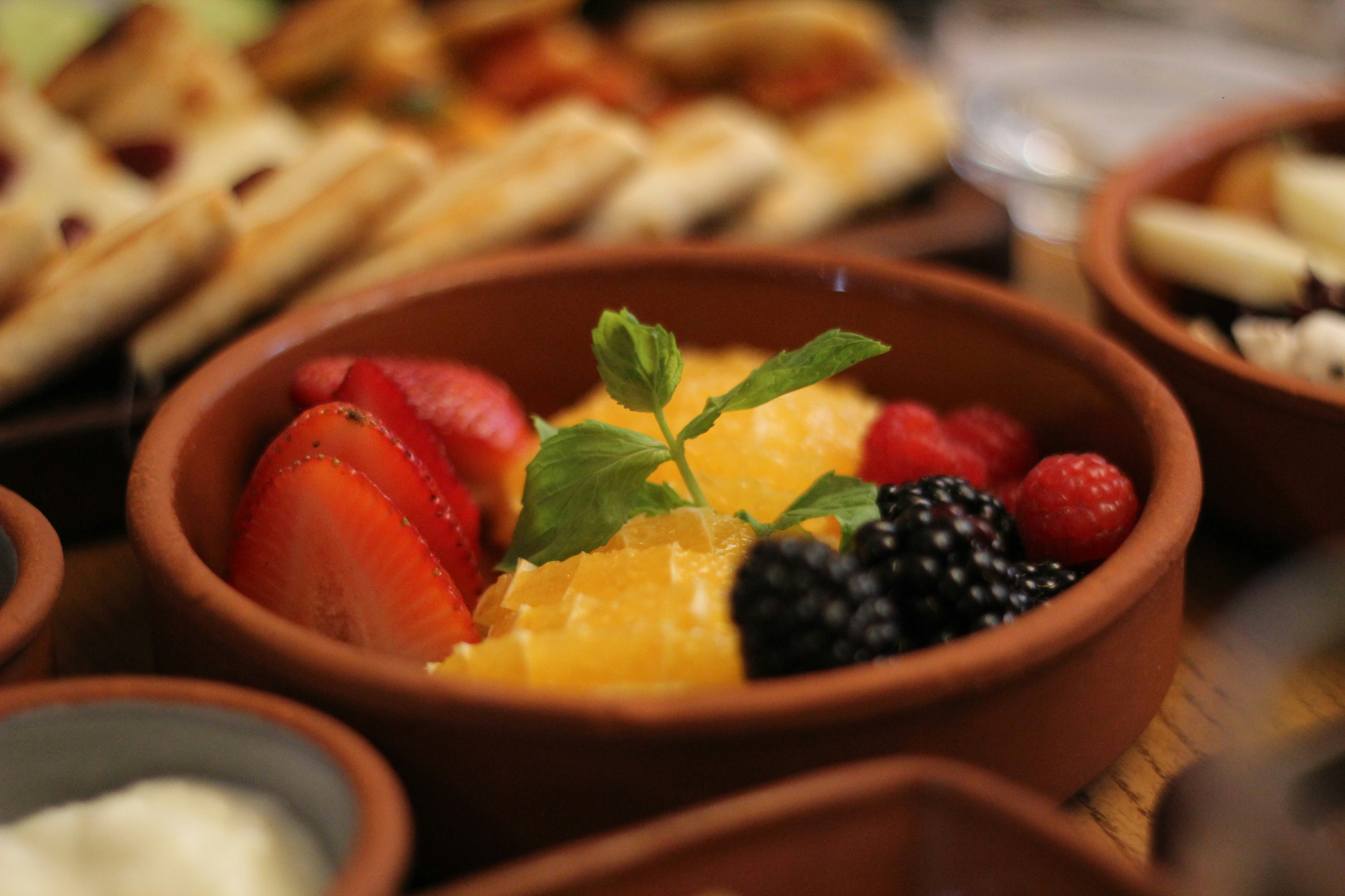 A close up of a bowl of fruit on a table photo – Free Food Image on ...
