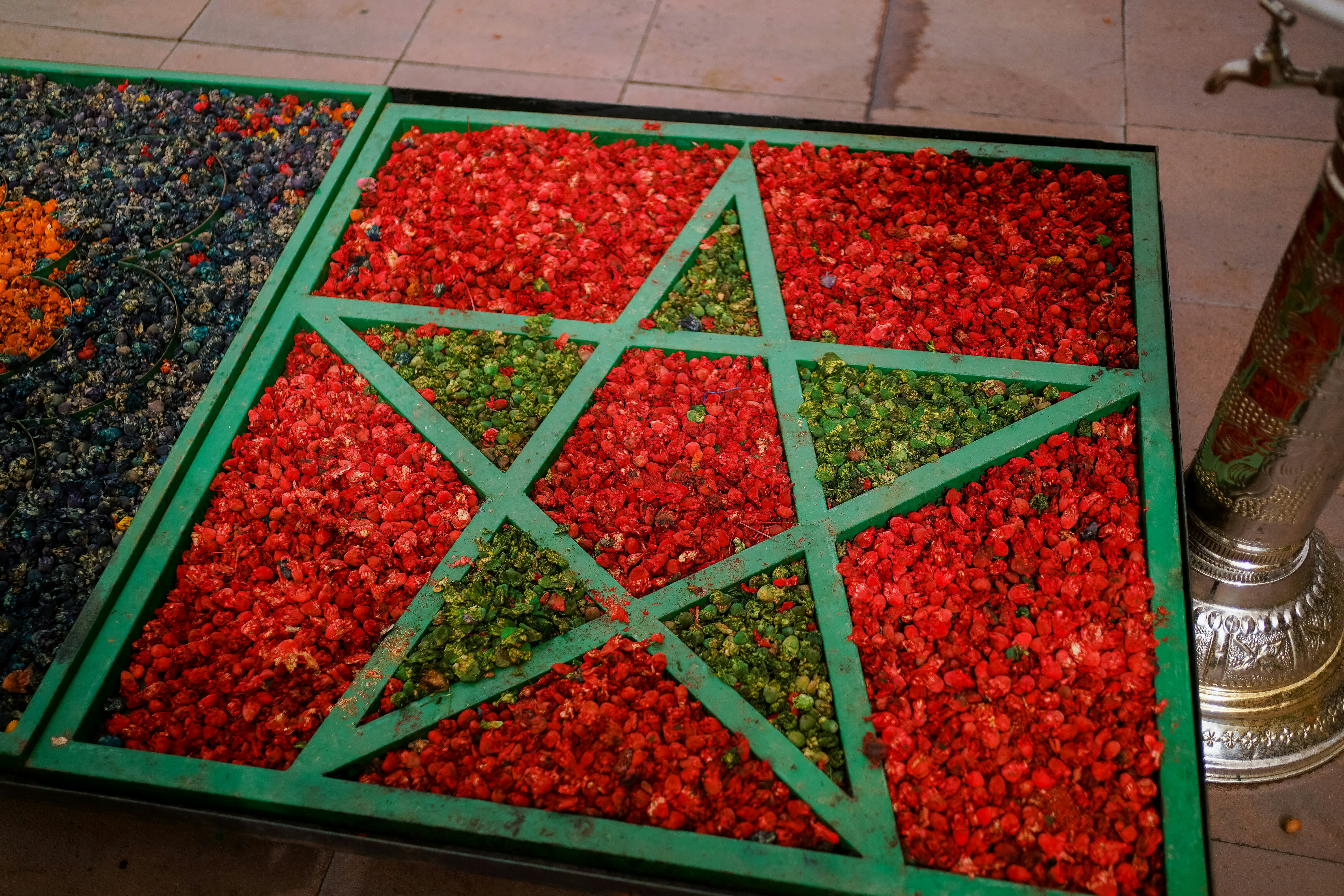 Green Star Segments: Floral Mosaic in a Window of Colors