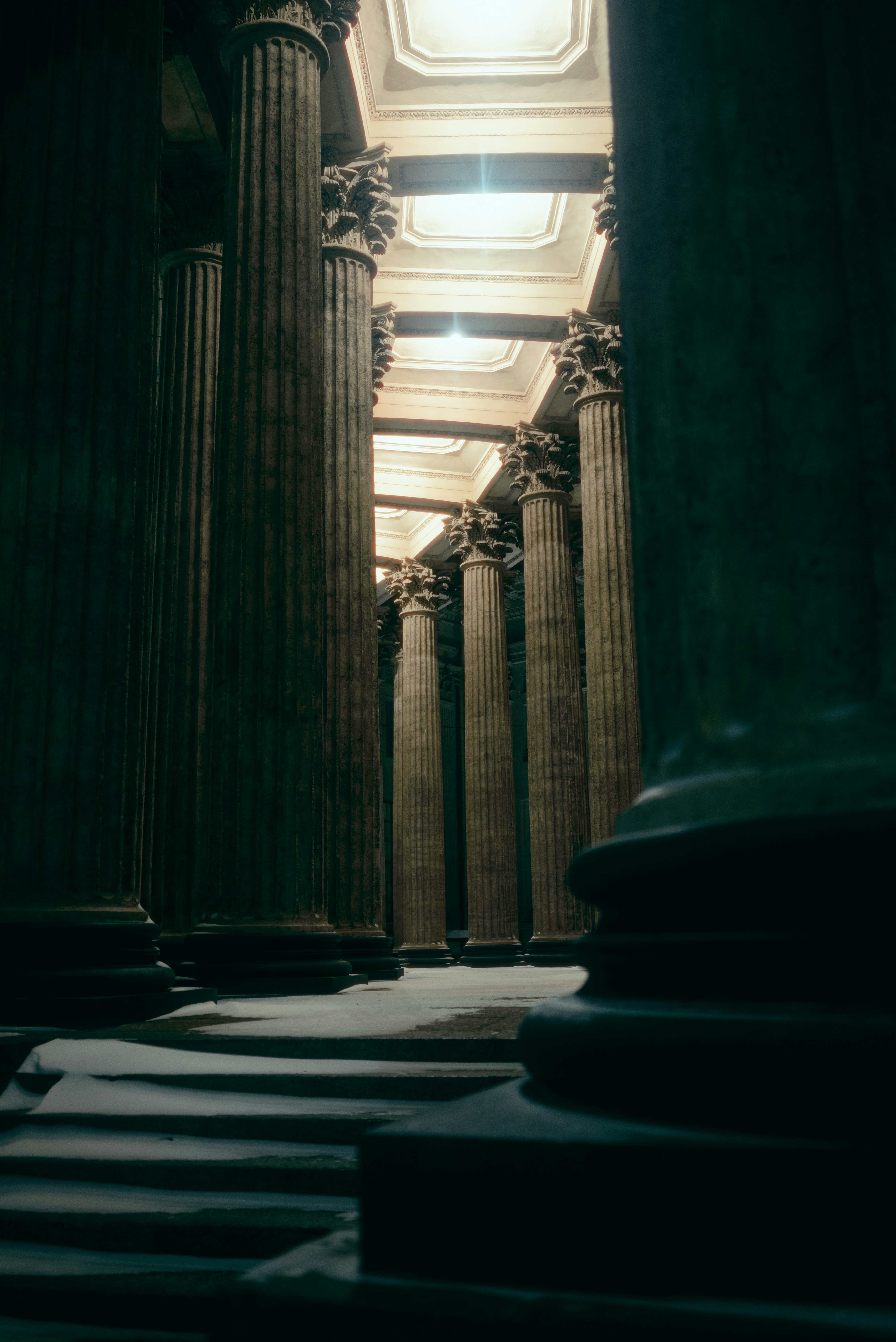 A dimly lit room with columns and lights photo – Free Building Image on ...