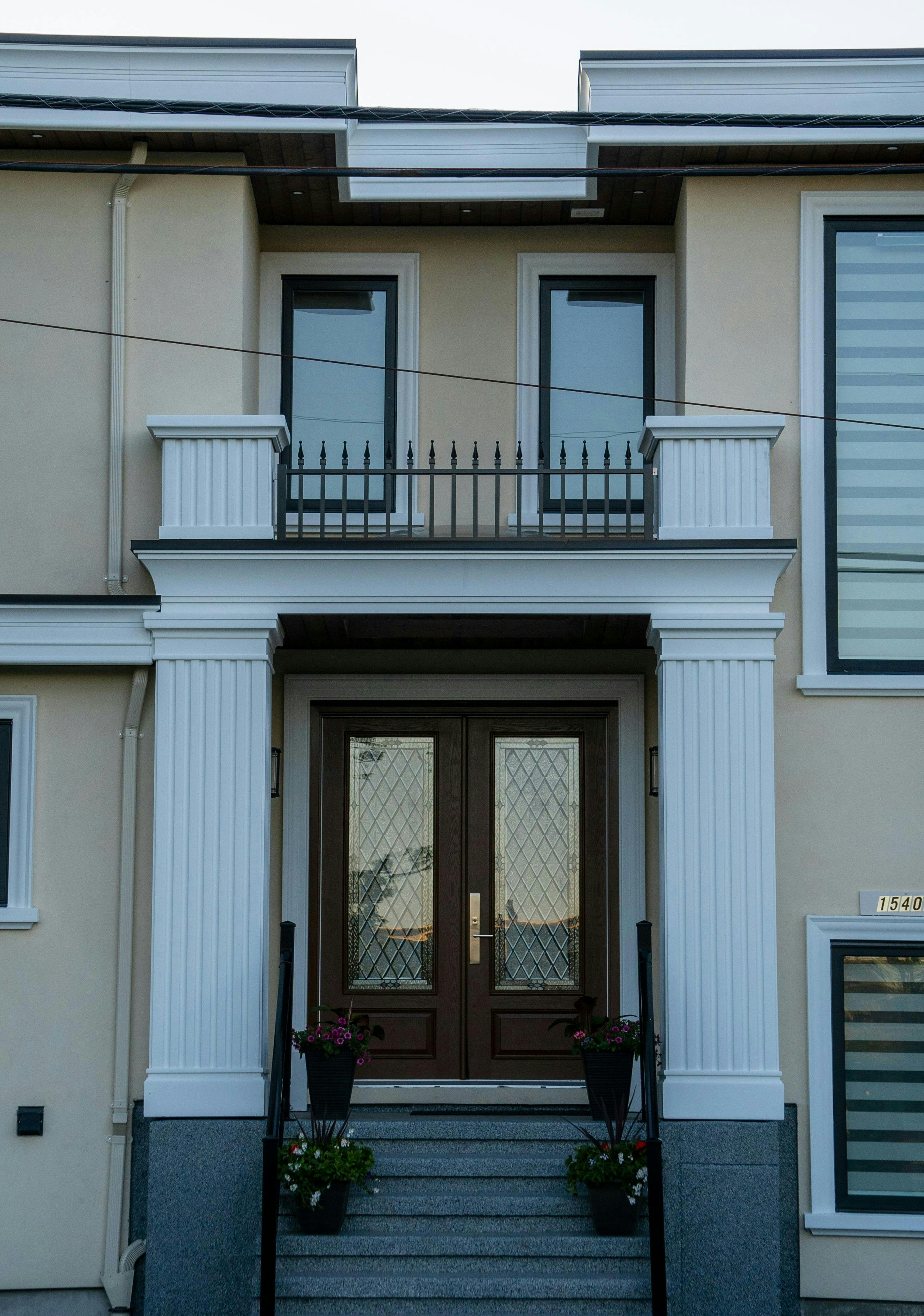 The front entrance of a two story house photo – Free Housing Image on ...
