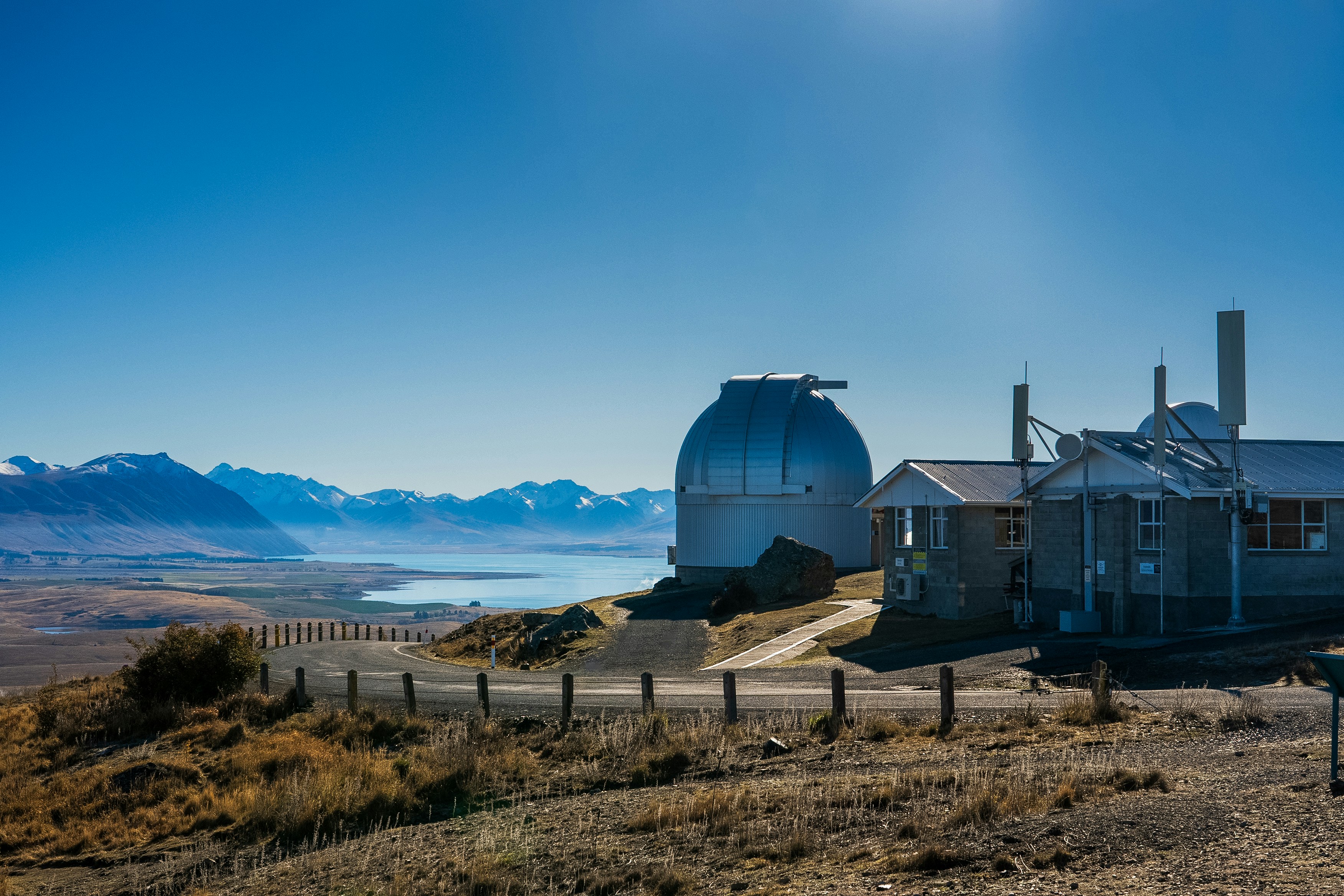 Dome Crest: An Isolated Observatory Beneath a Wide Blue Sky