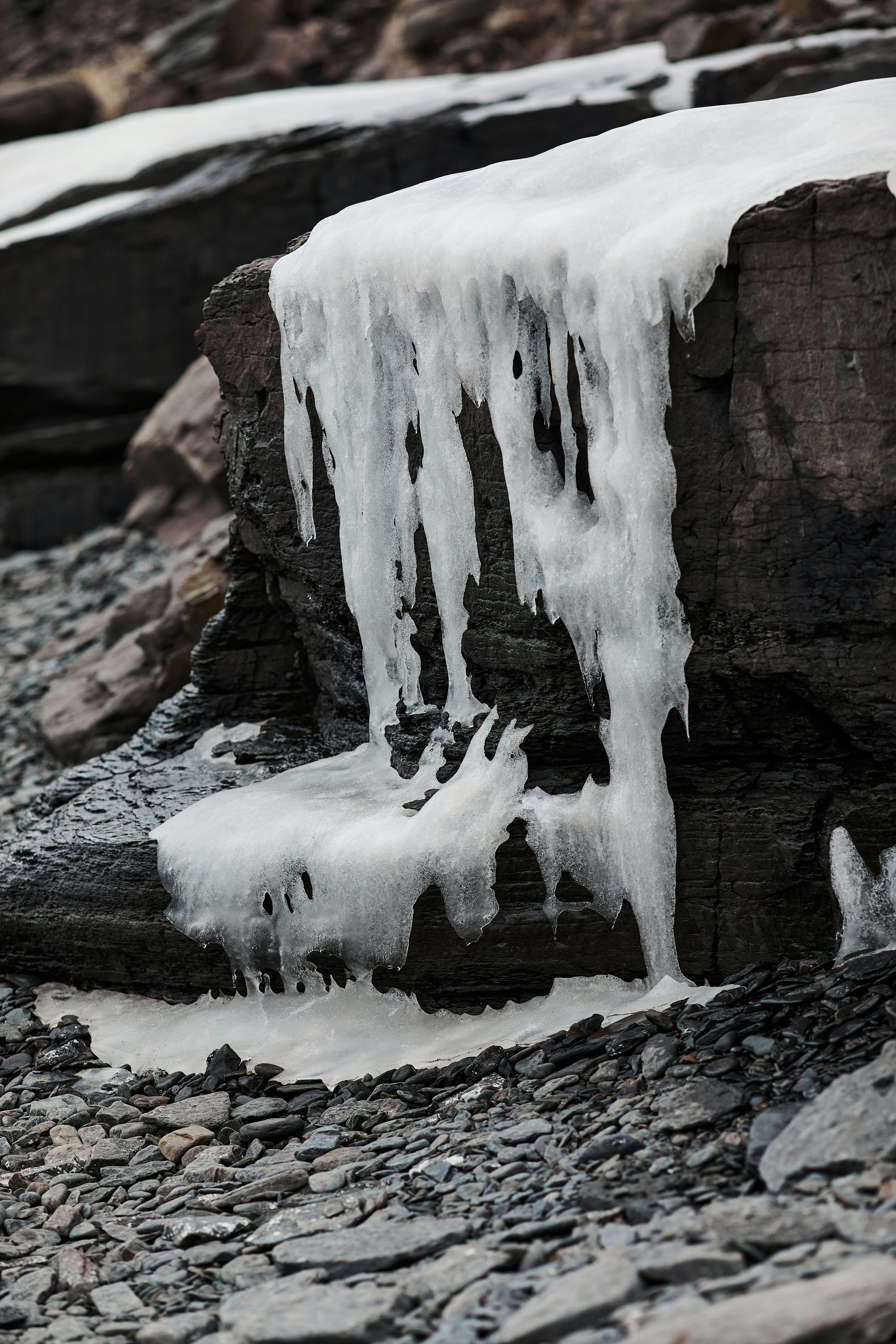 Frozen Cascade on Weathered Rocks