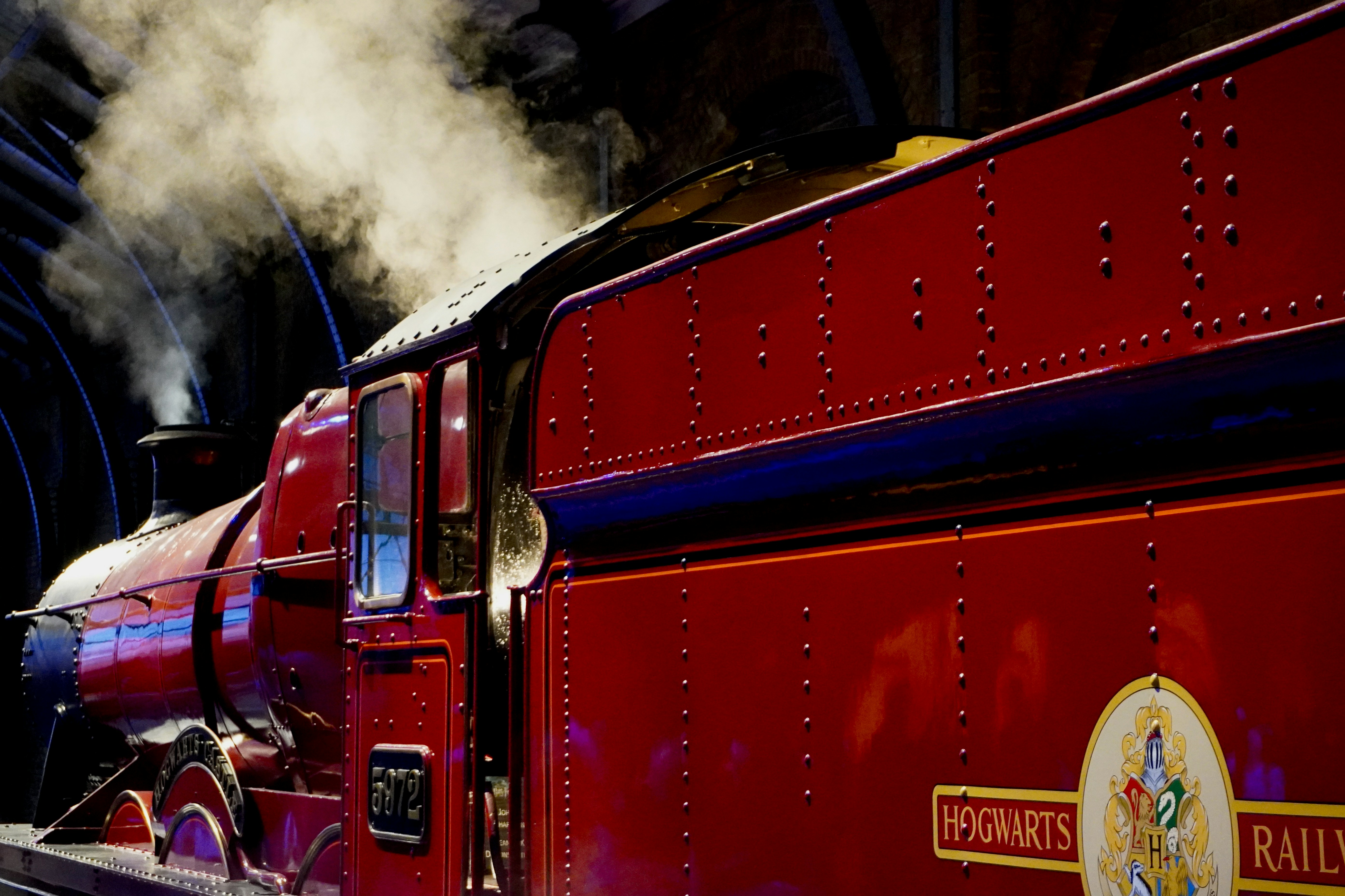 Crimson Locomotion: Hogwarts Crest on a Steam-Driven Heritage Engine