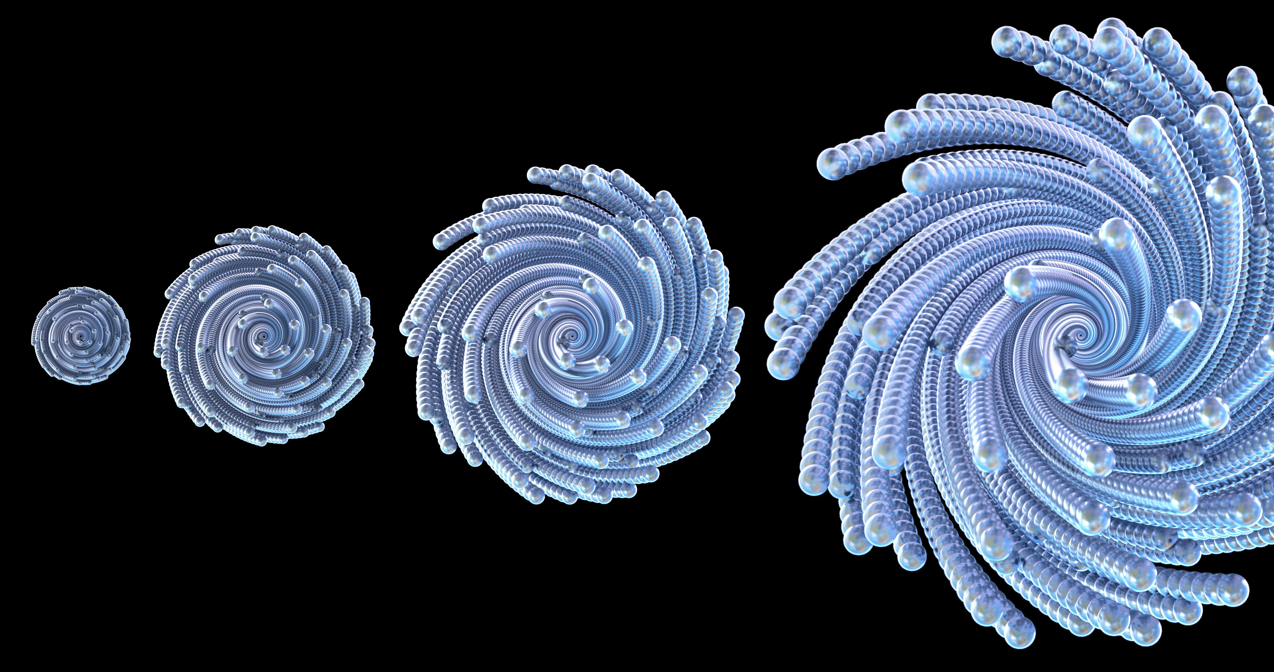 A group of three blue spirals on a black background photo – Free Spiral ...