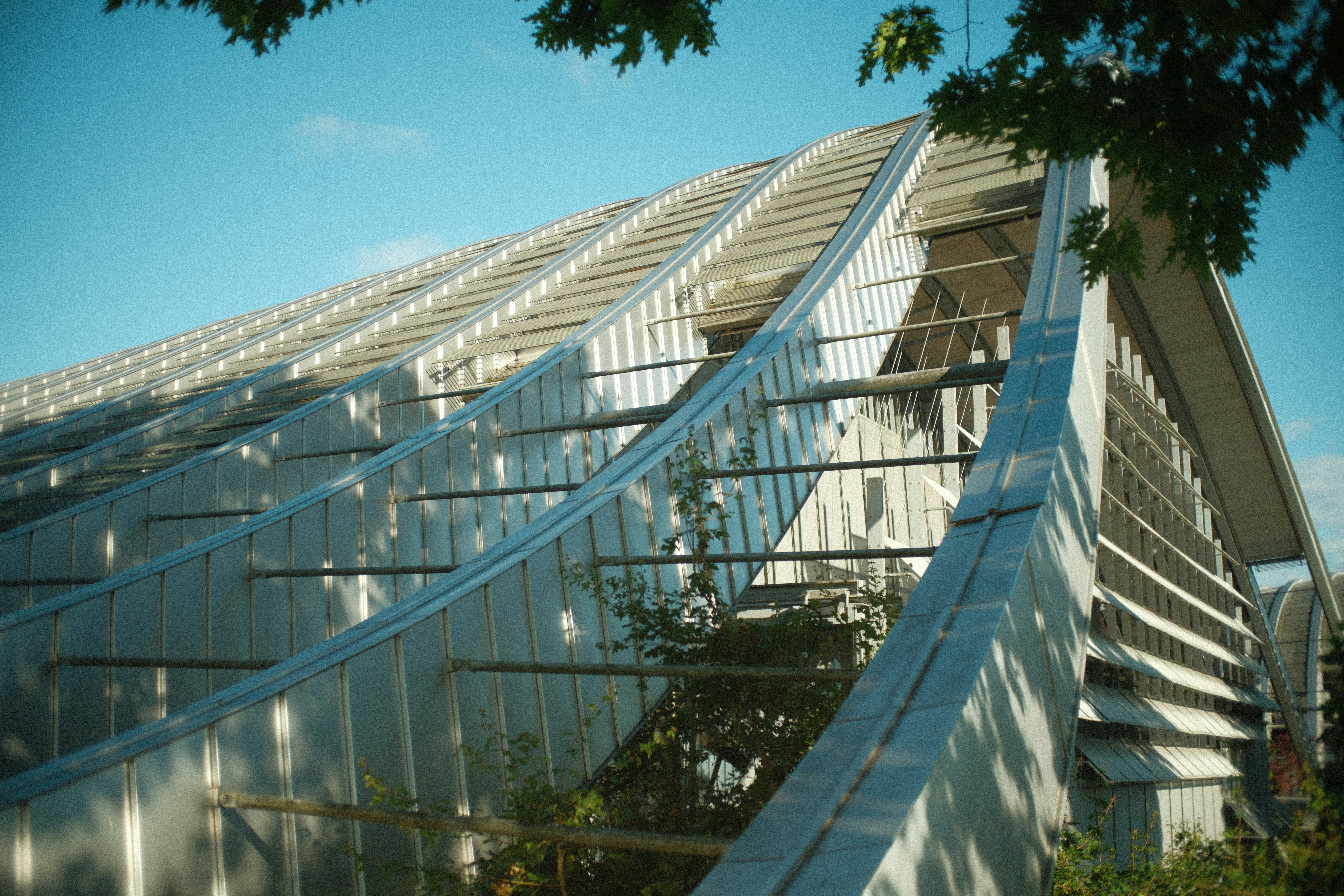A very tall building with a very long metal staircase photo – Free Bern ...