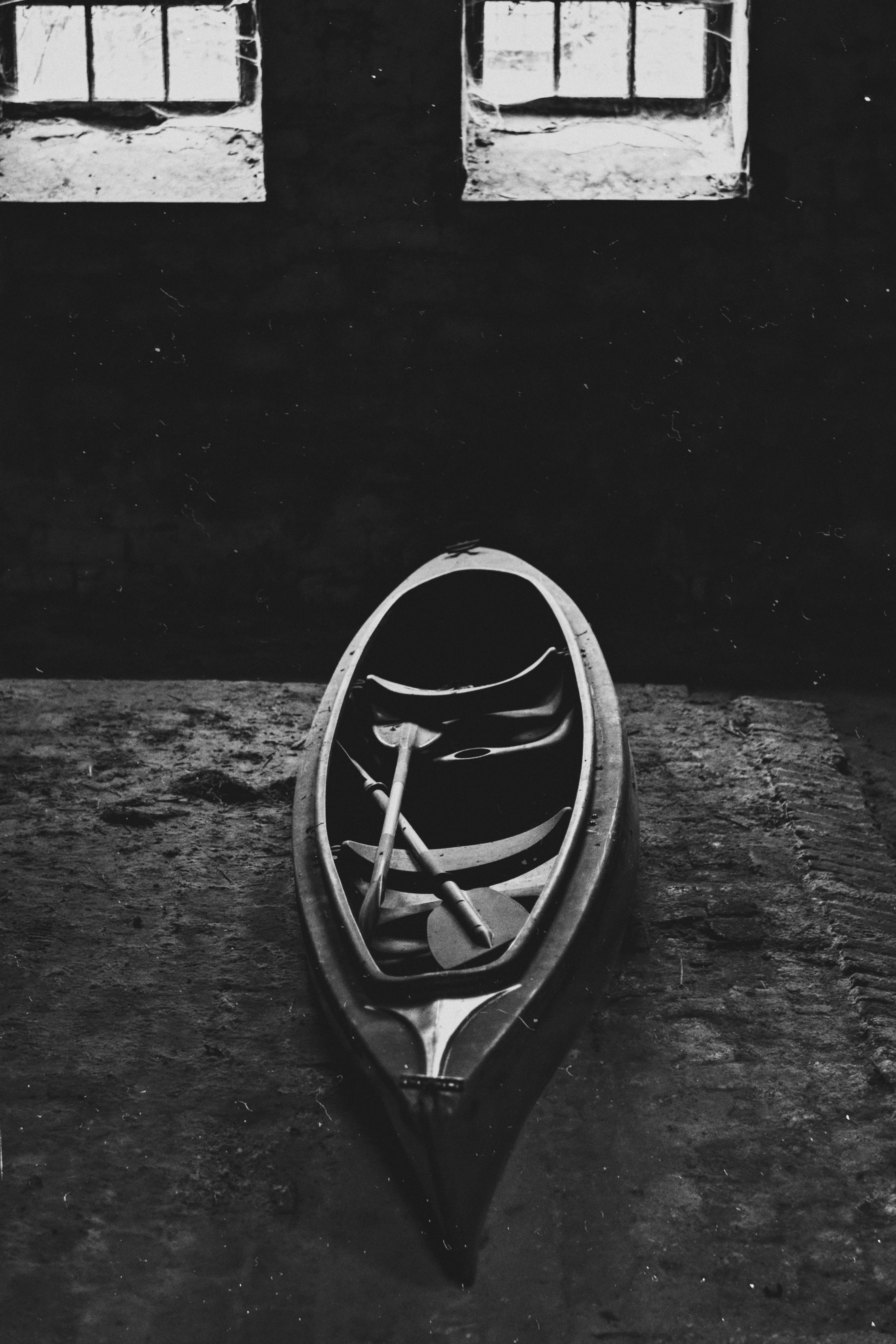 Solitary Boat Shoe on a Weathered Dock: A Quiet Monochrome Moment