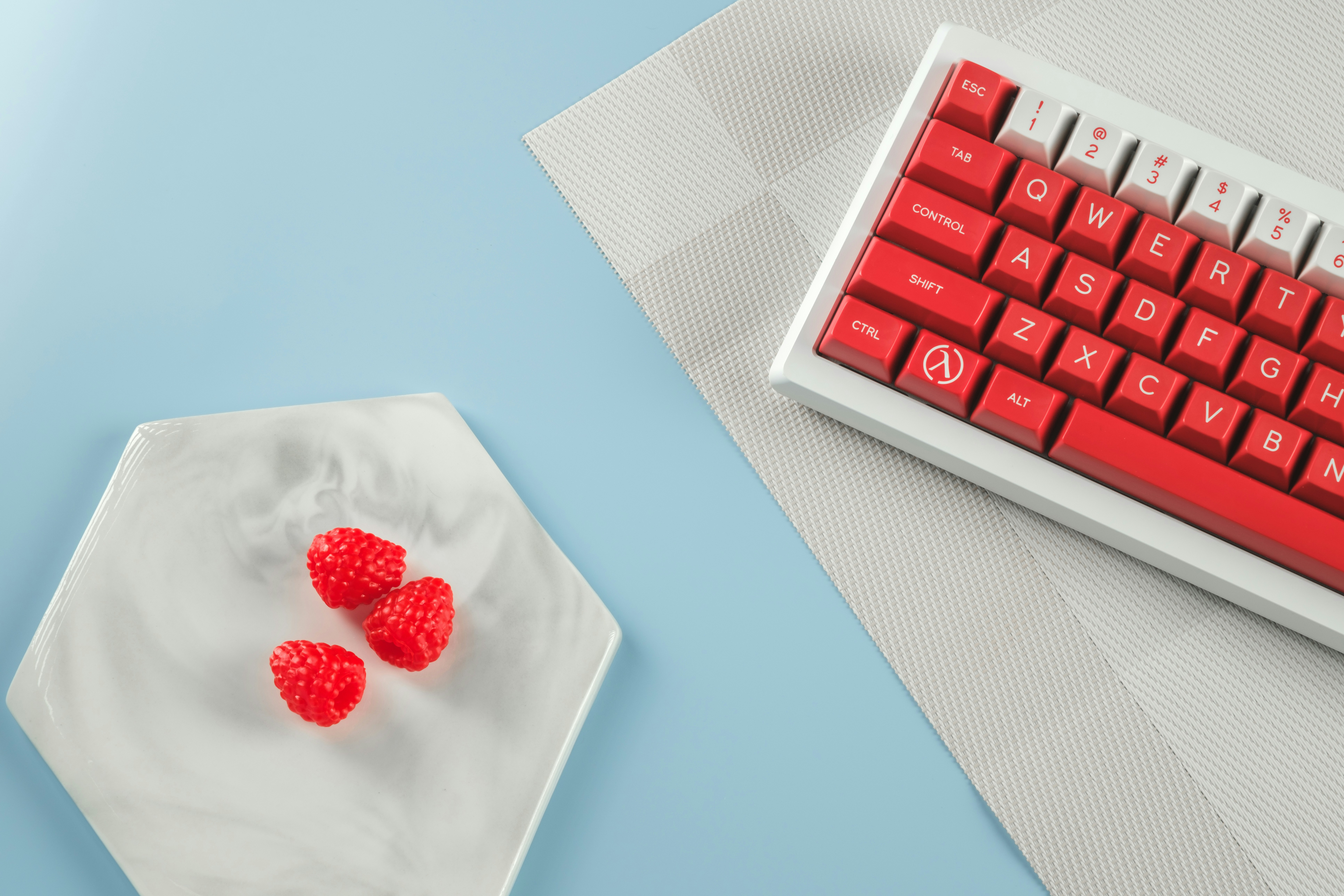 A red keyboard and some red hearts on a blue table photo – Free ...