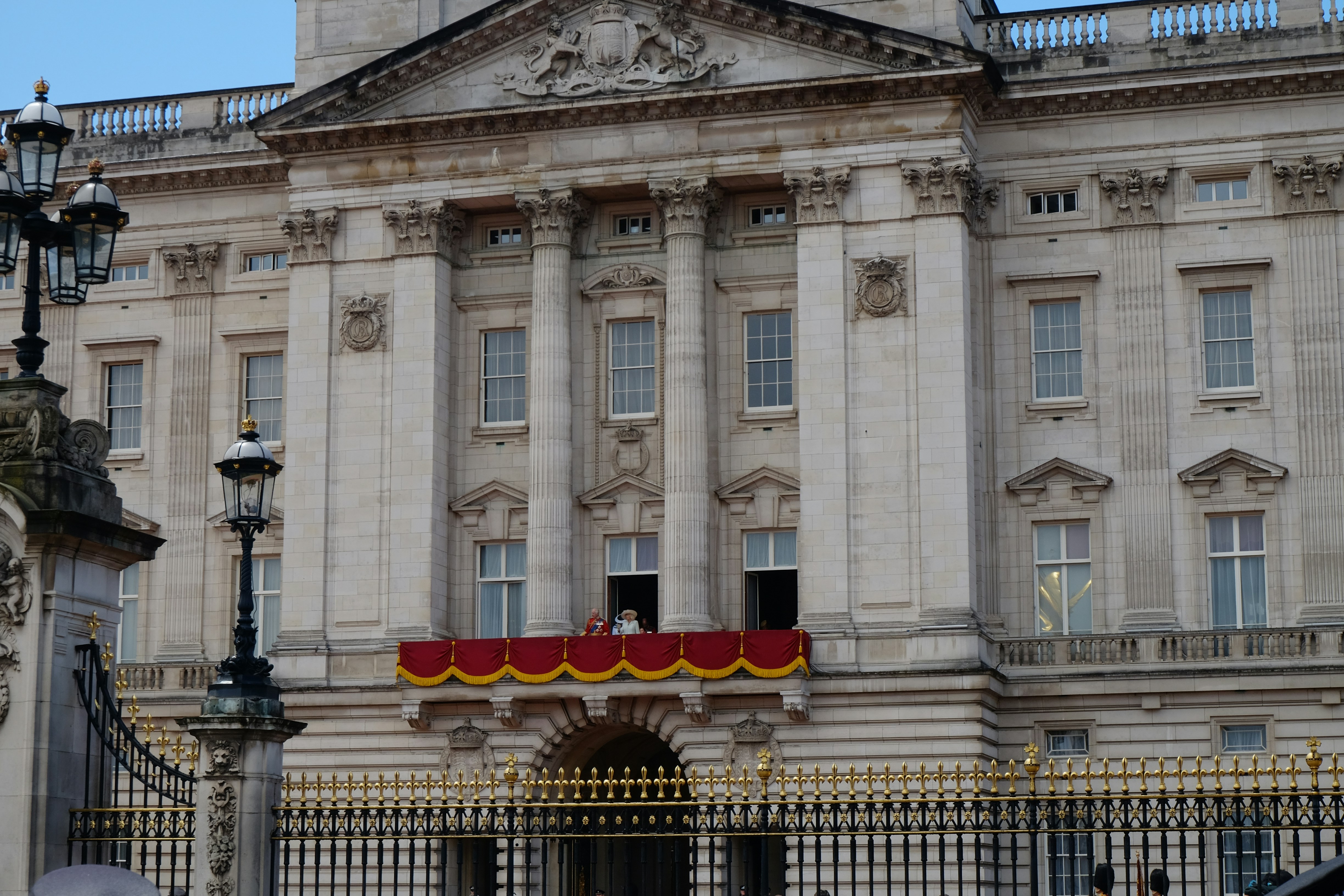 A large building with a clock tower on top of it photo – Free ...