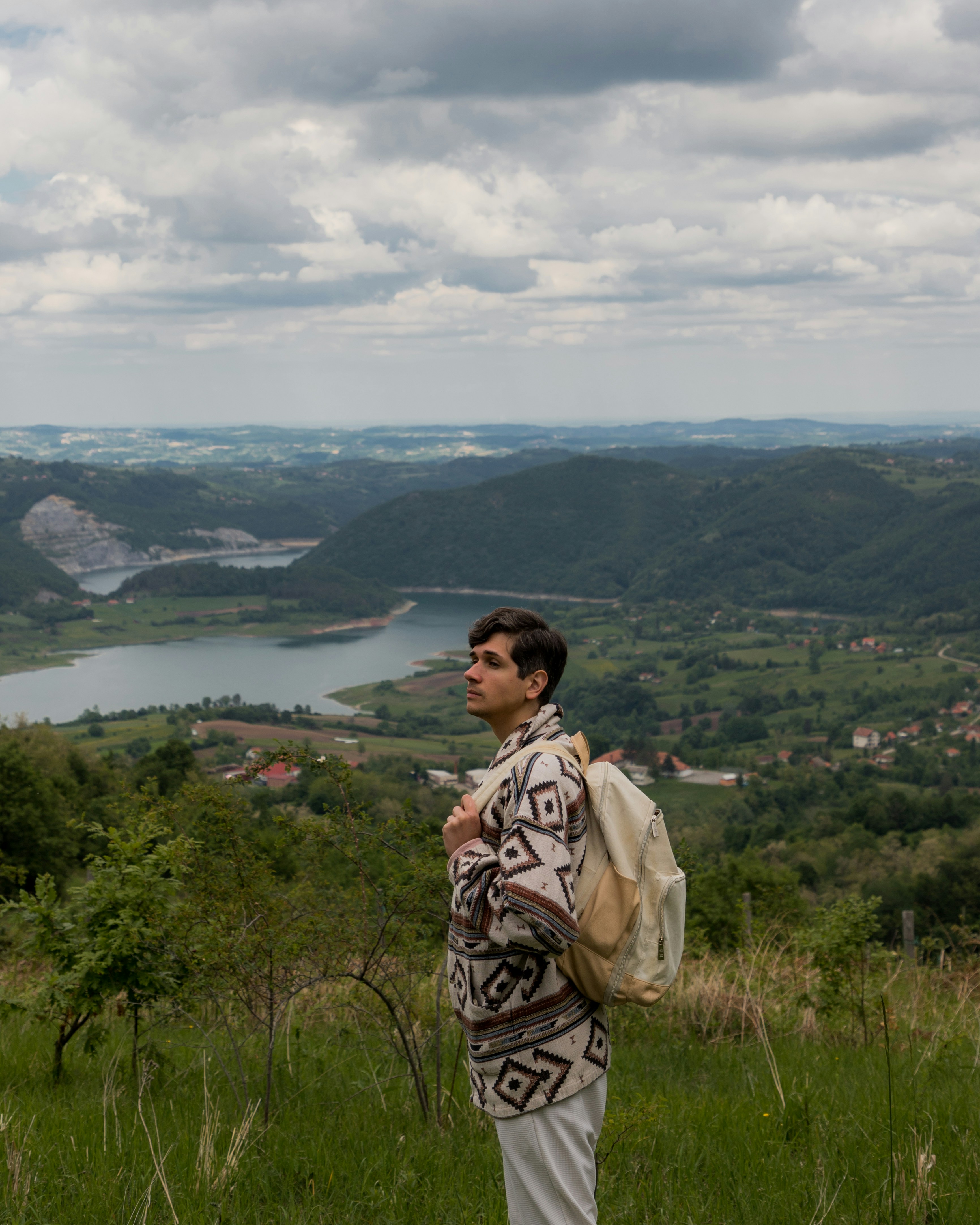 Ridge Gaze over a Winding Lake Valley