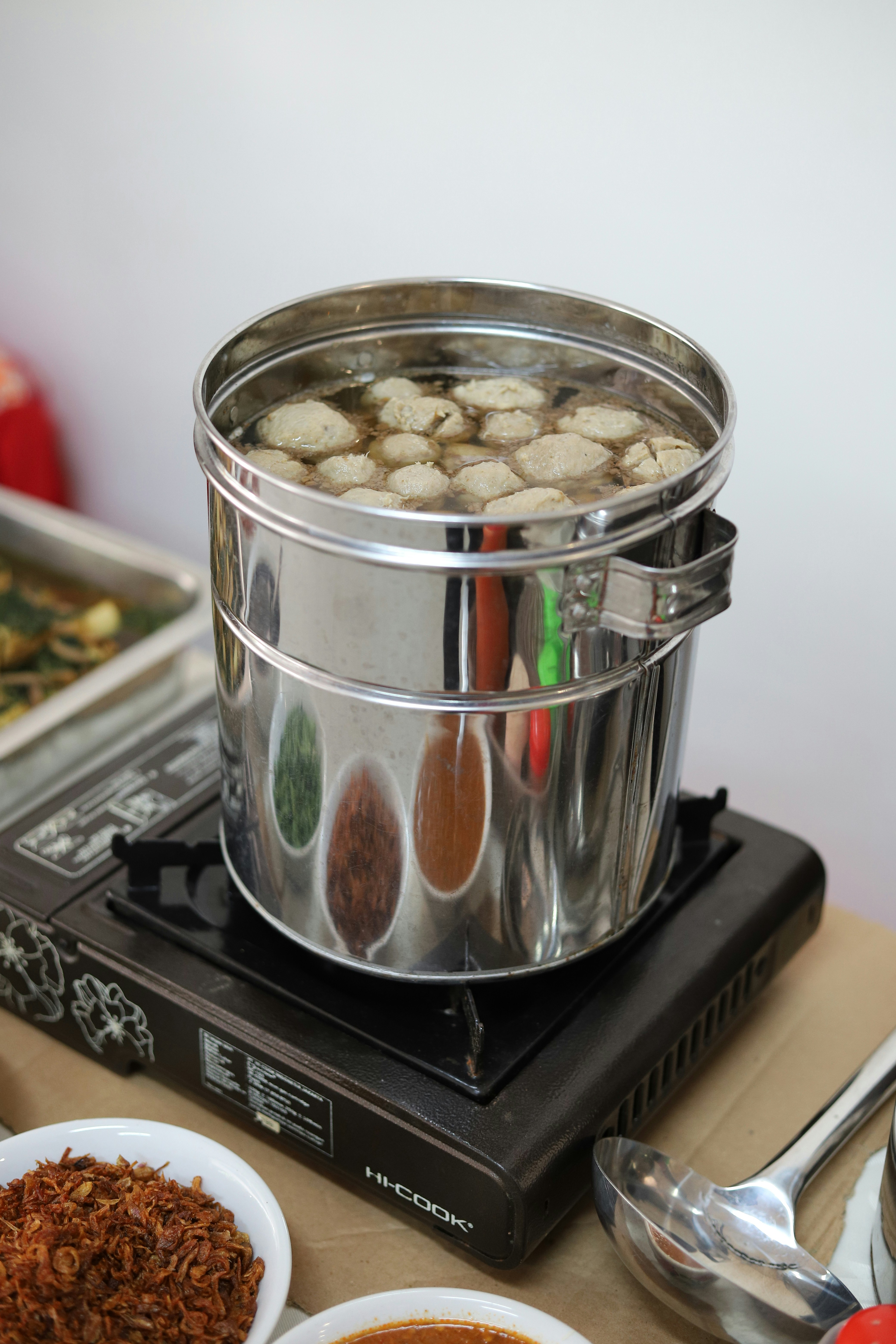 Chrome Steamer on a Compact Burner: Dumplings Rising in Quiet Steam