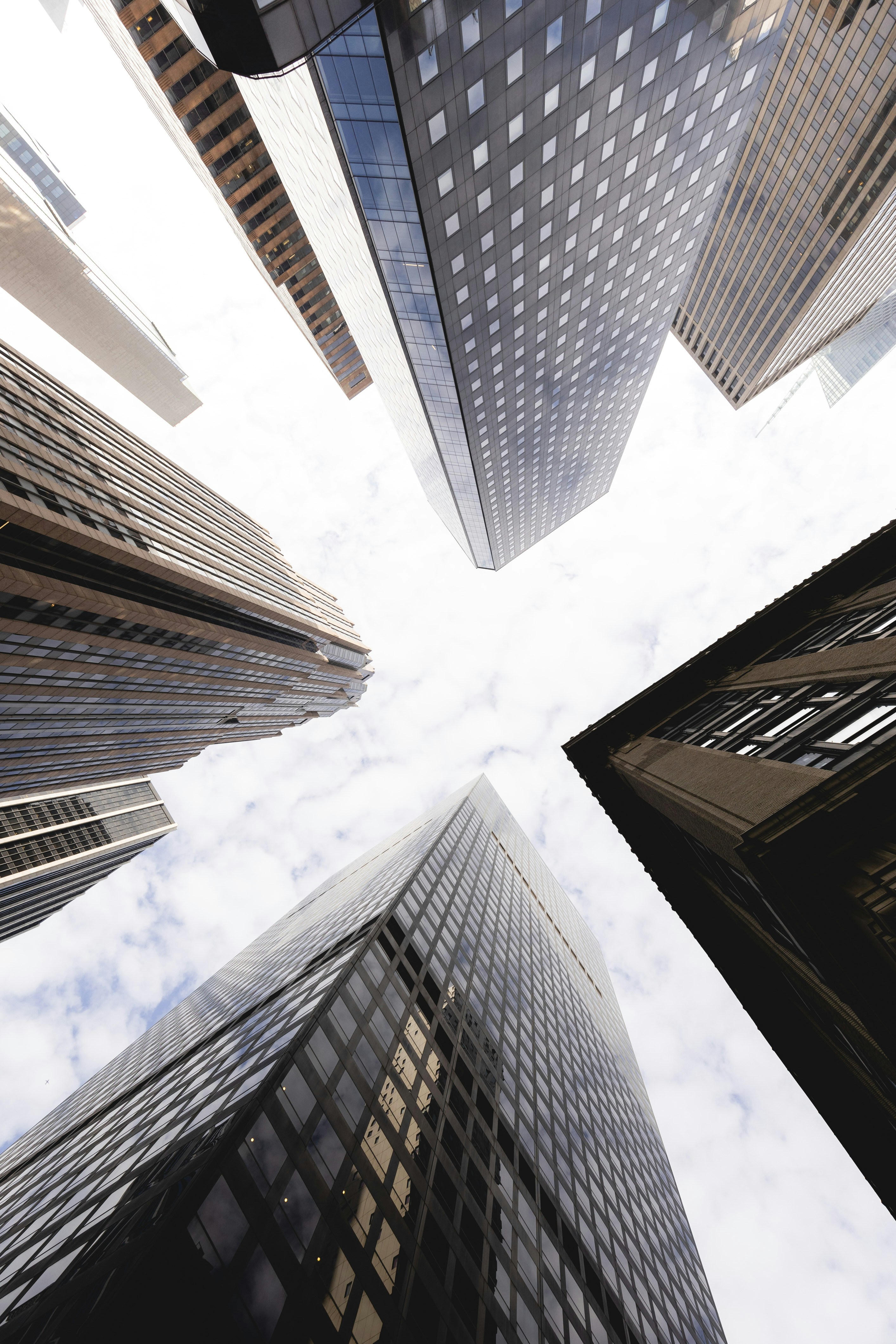 Looking up at tall buildings in a city photo – Free Building Image on ...