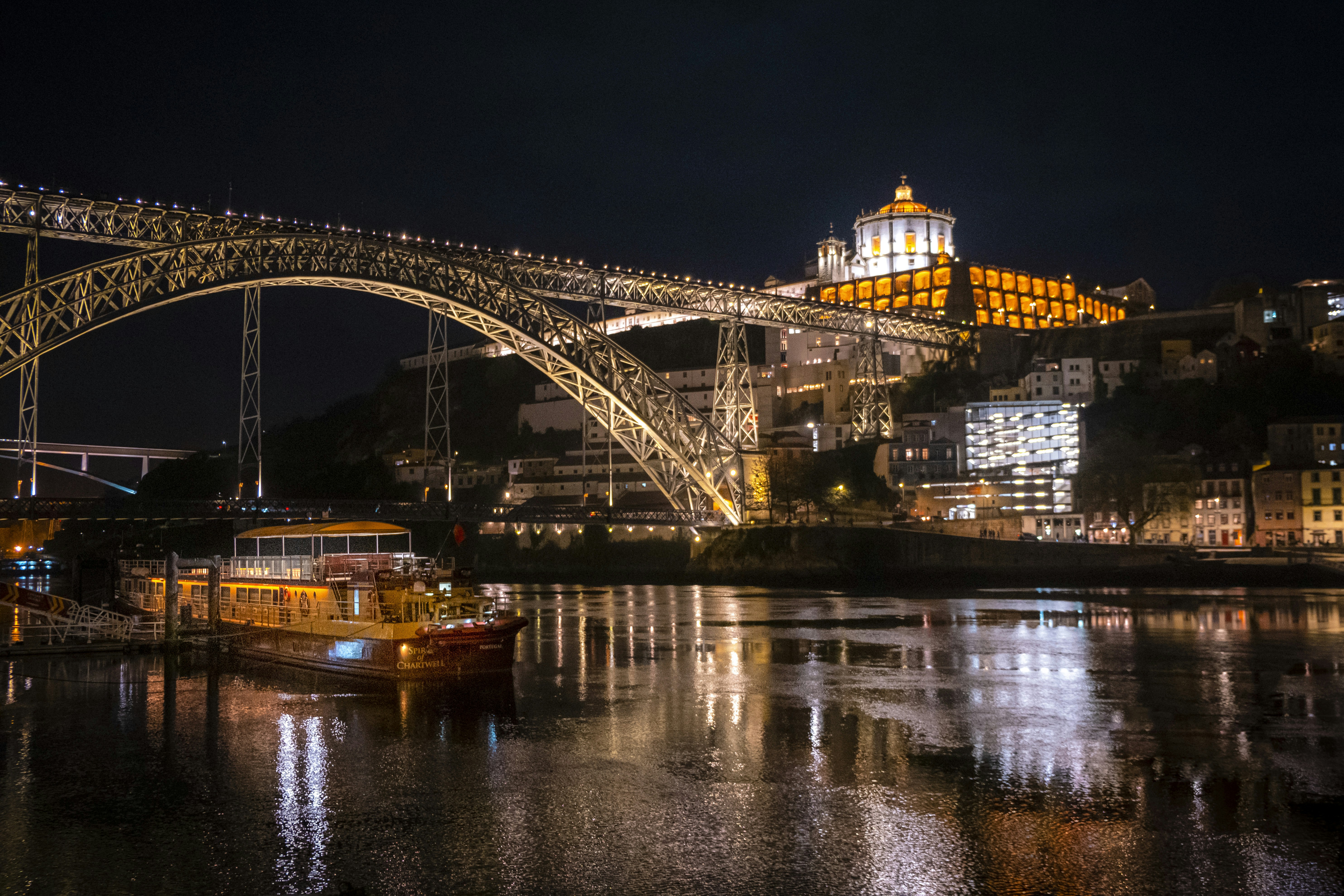 Night with reflections of lights in Porto