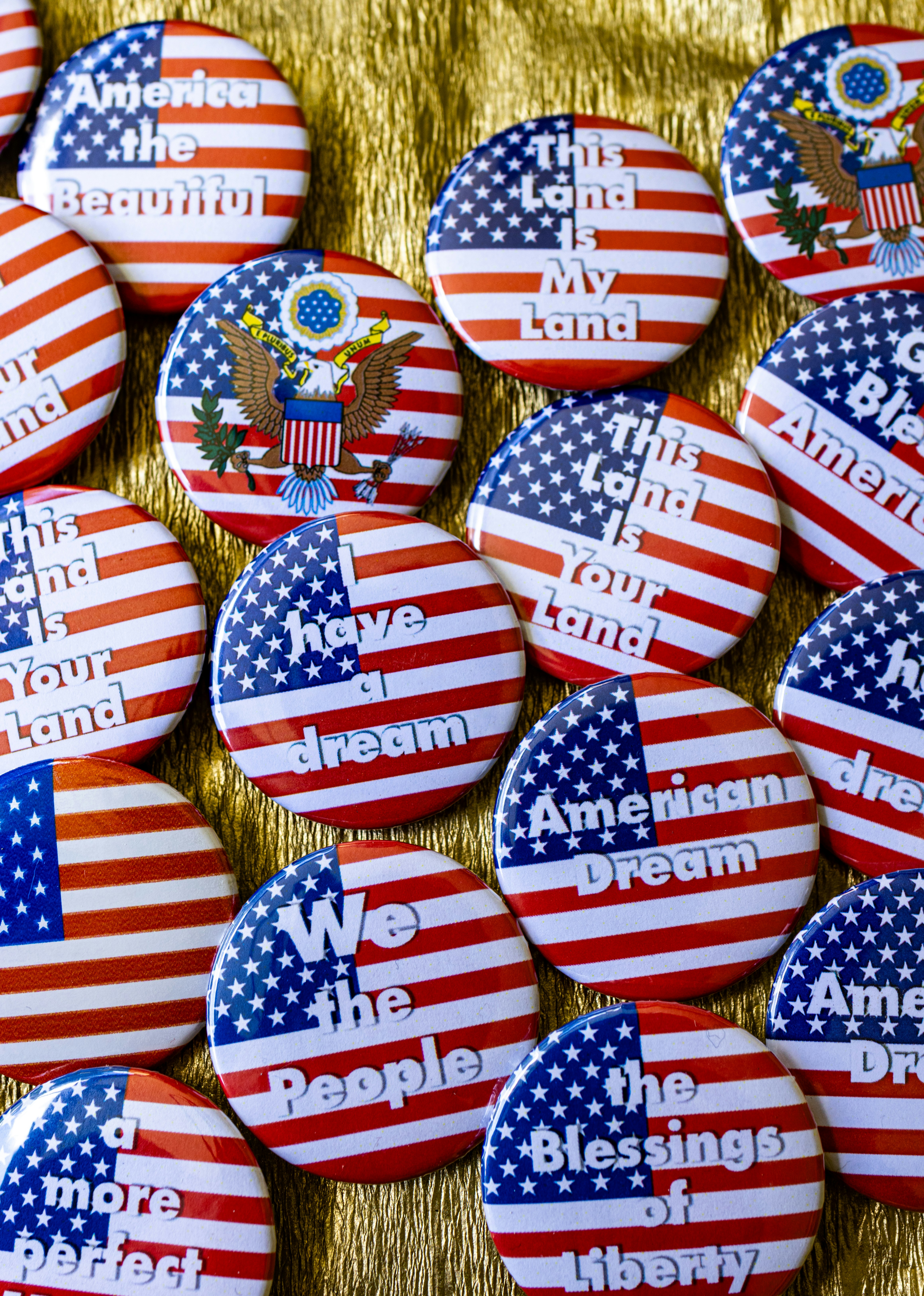 Patriotic Button Mosaic: This Land Is My Land on a Golden Backdrop