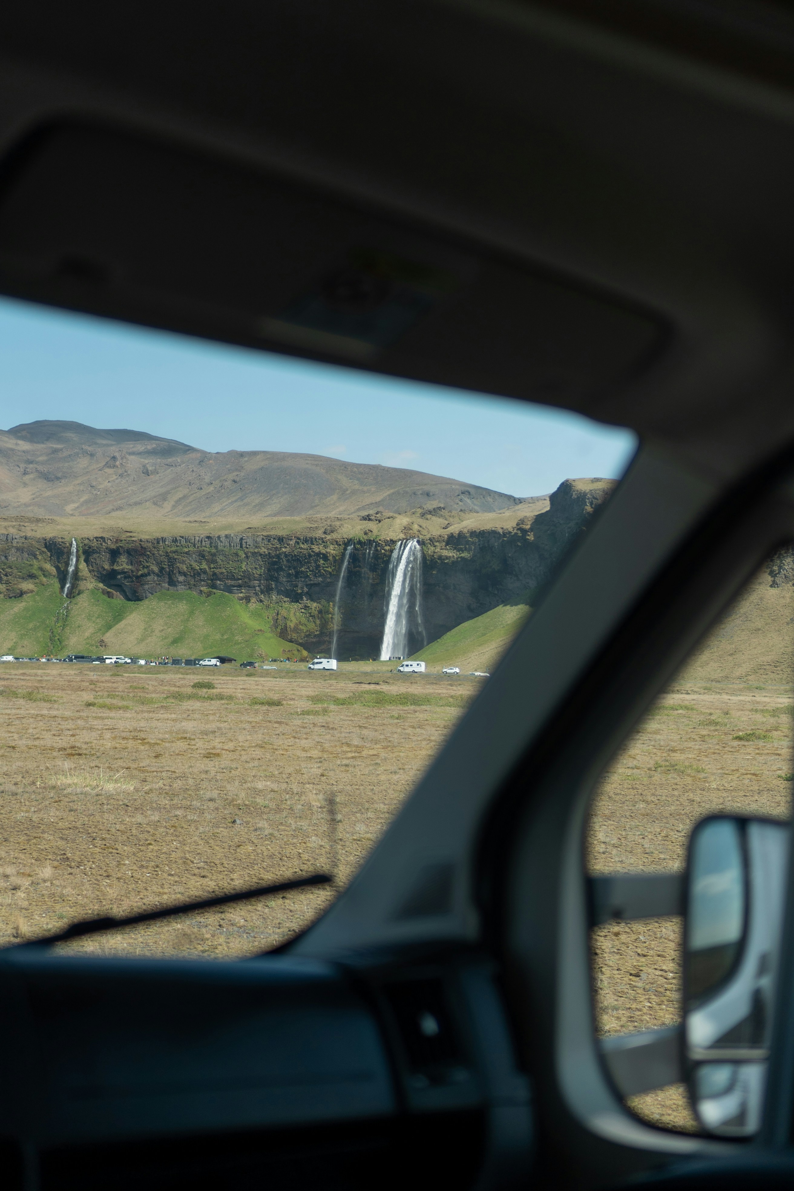 Icelandic Falls Framed by a Window: A Quiet Plains Perspective