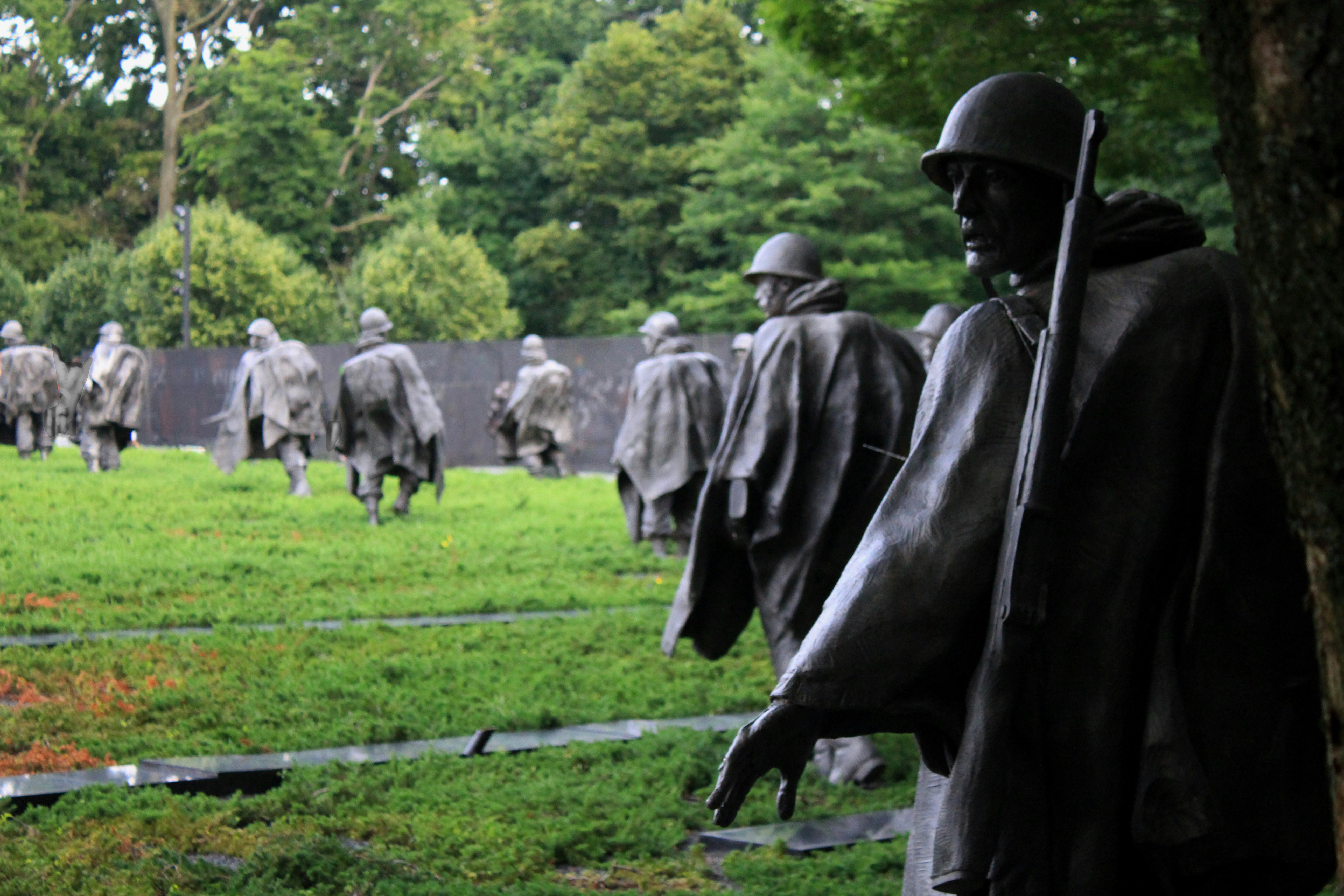 A group of statues of men in a field photo – Free Washington dc Image ...