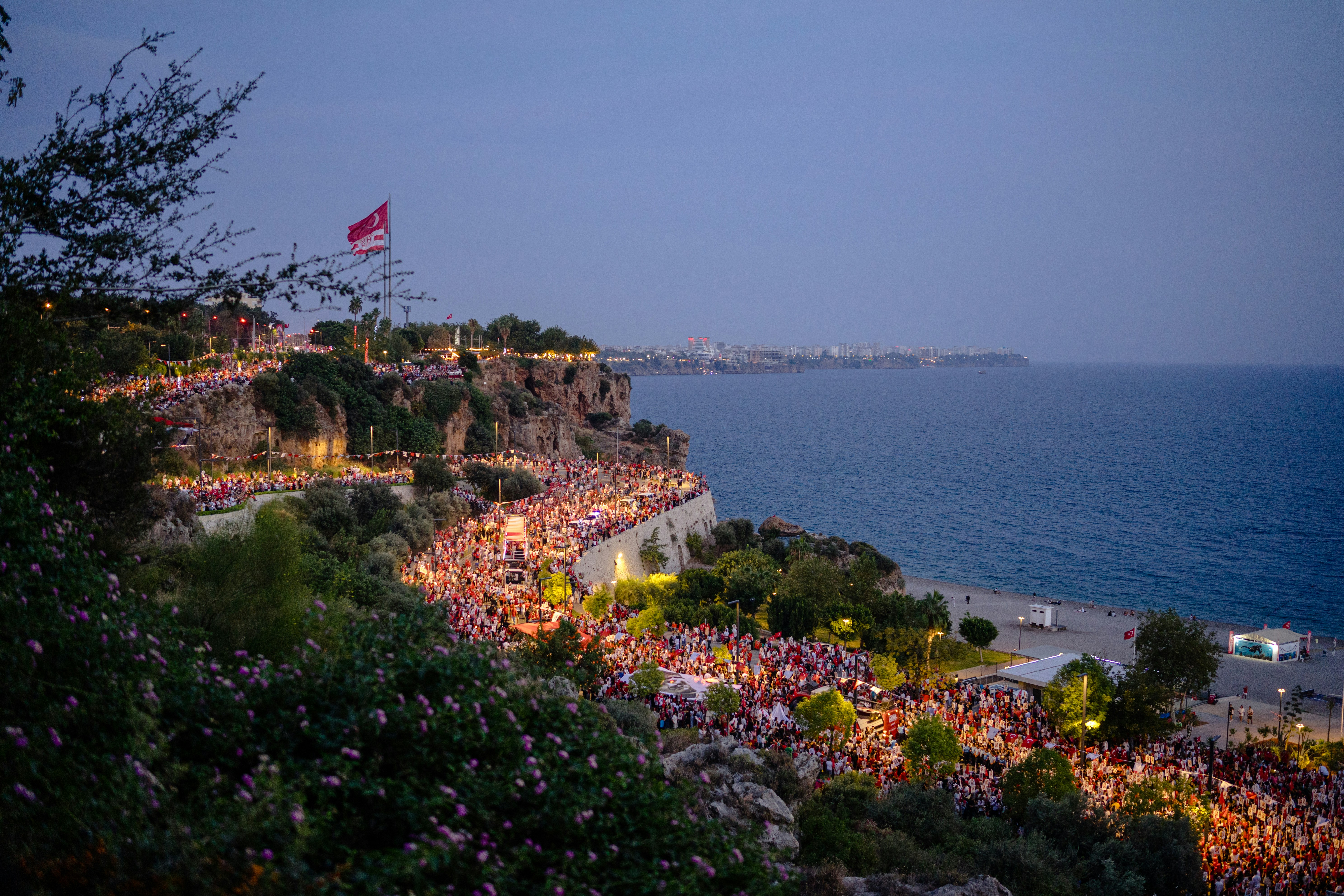 Festival by the Cliffs: Crowds Along the Sea Rim