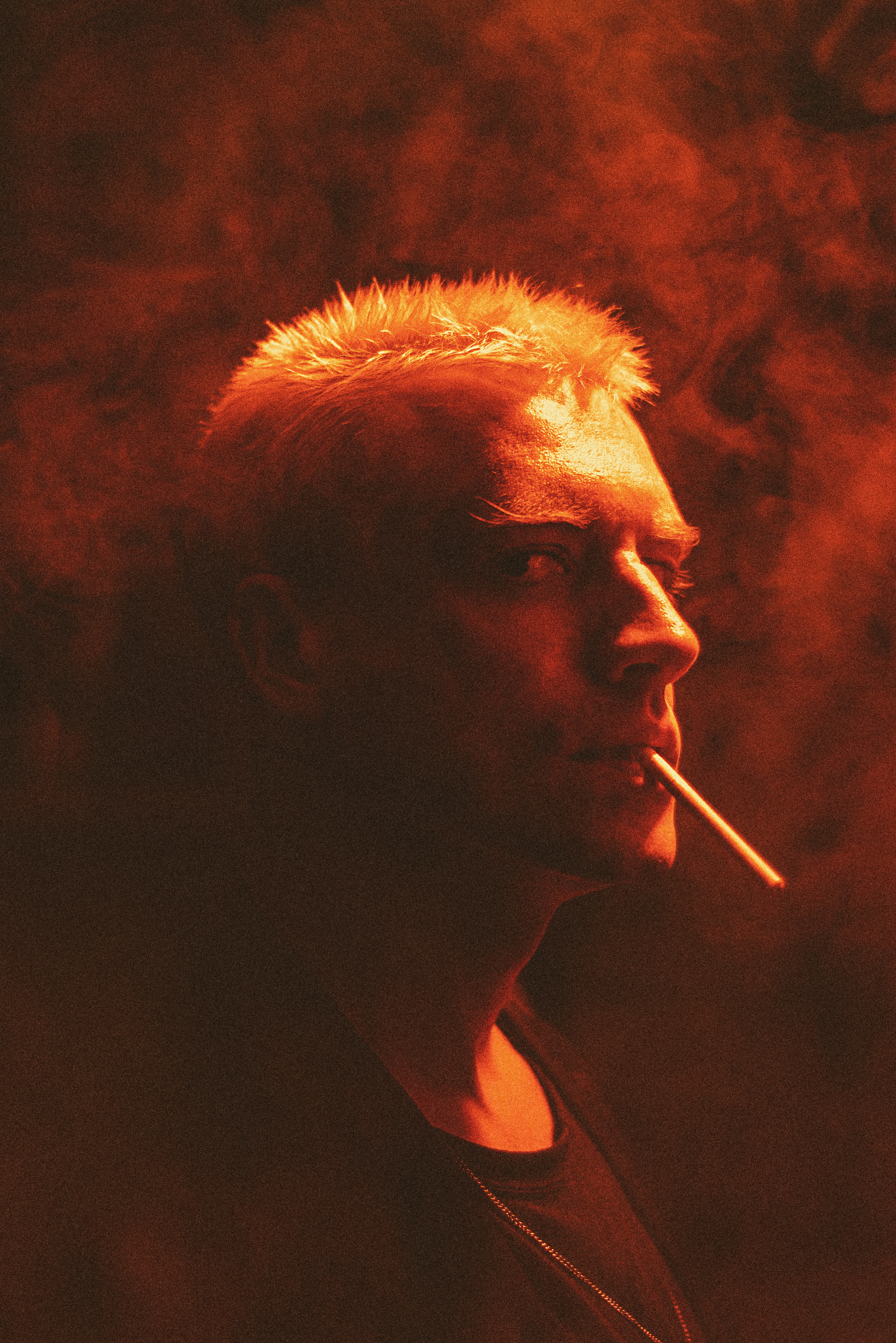 Ember Dusk: A Cigarette Glow Between Shadows