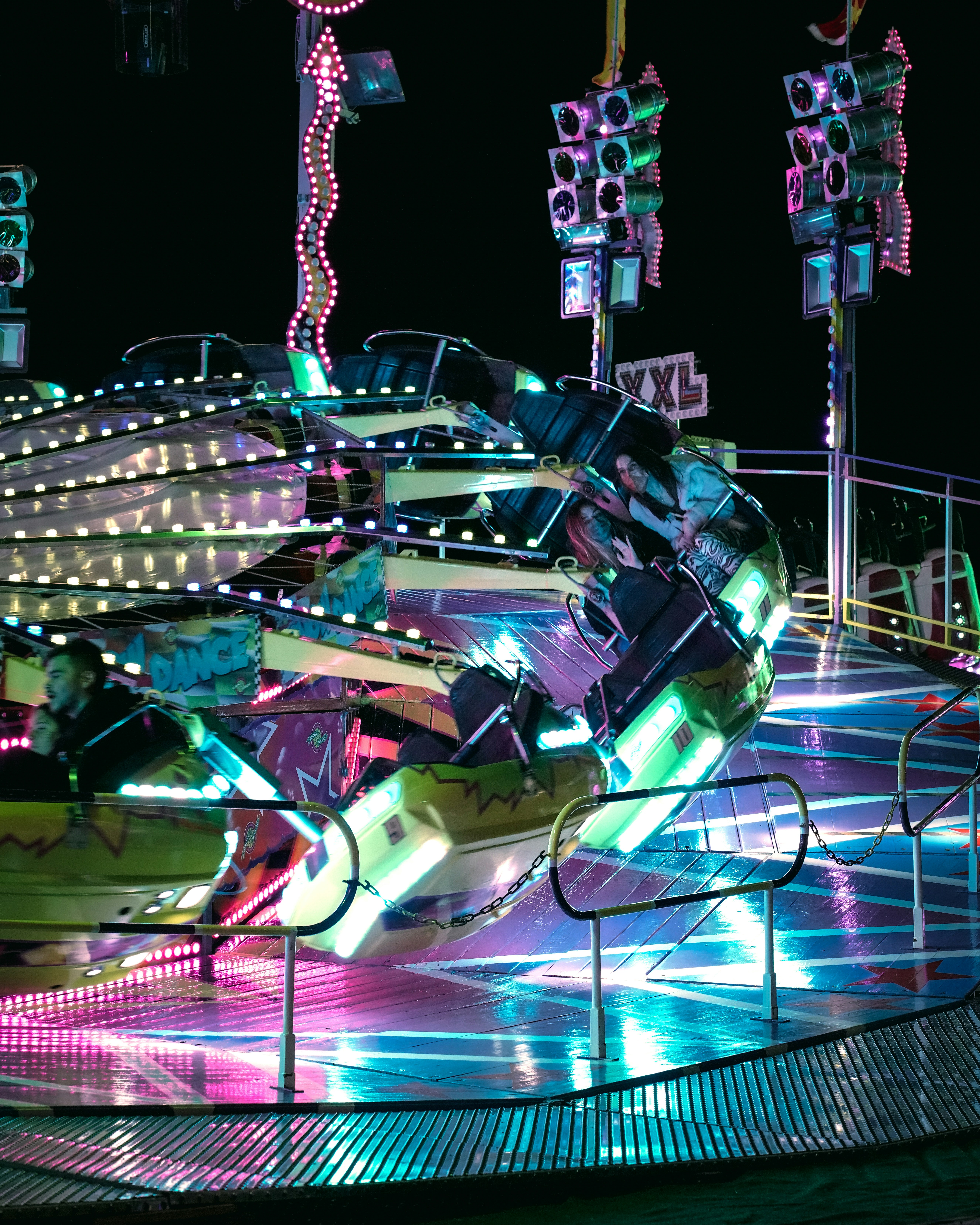 Neon Spiral: Night Ride in Motion