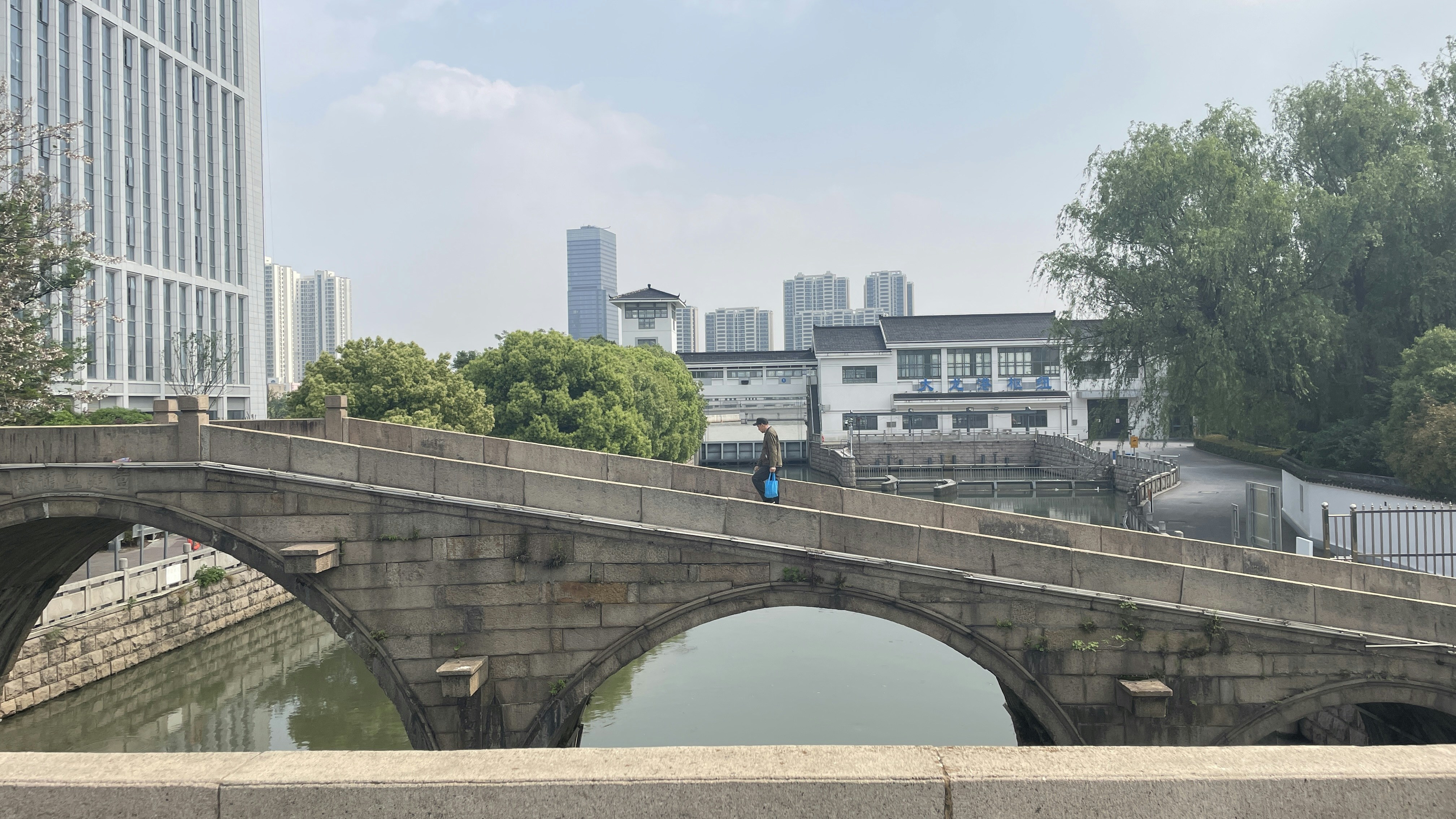 A bridge over a body of water in a city