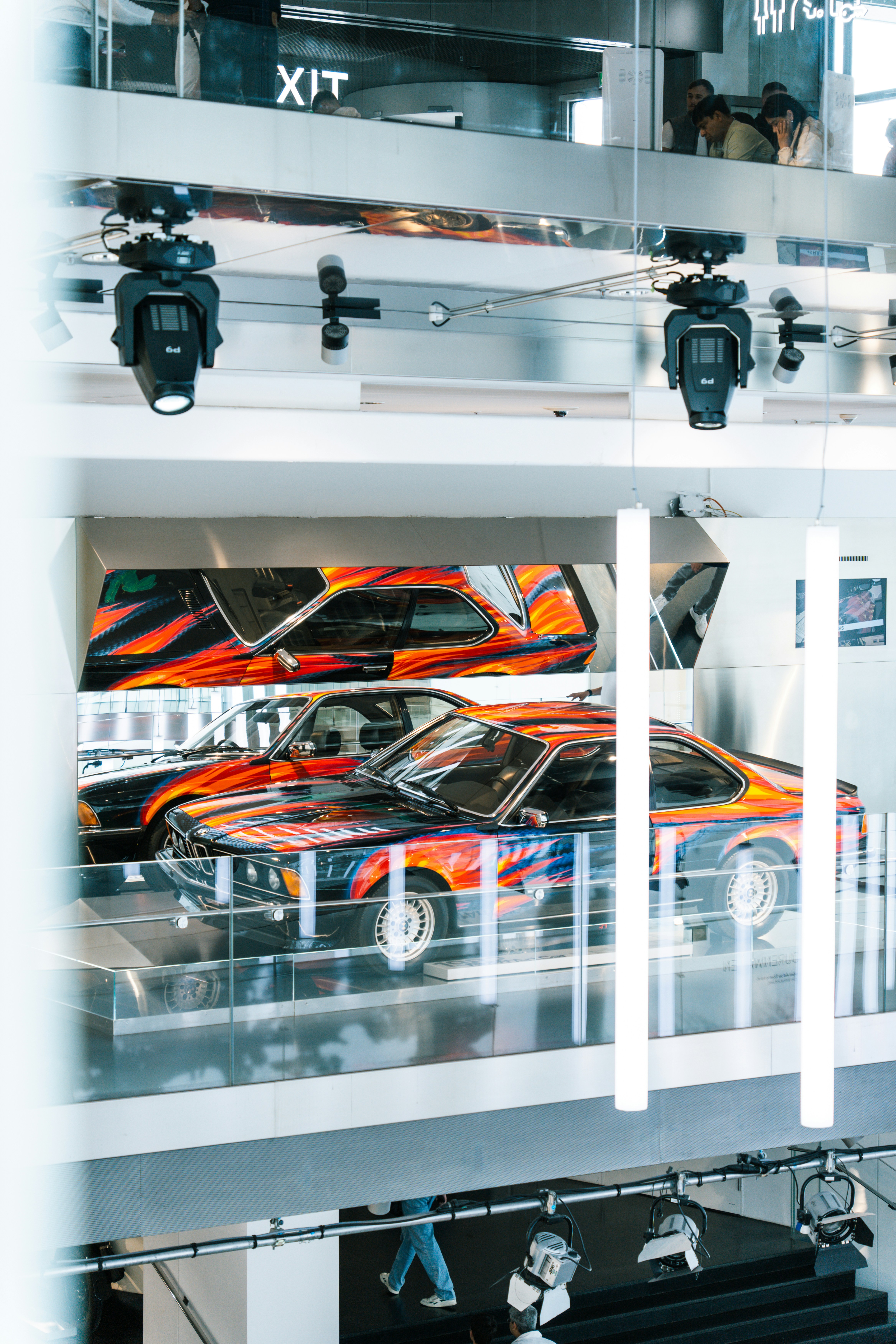 Flame-Lit Classics: A Glass-Front Car Gallery of Racing Color
