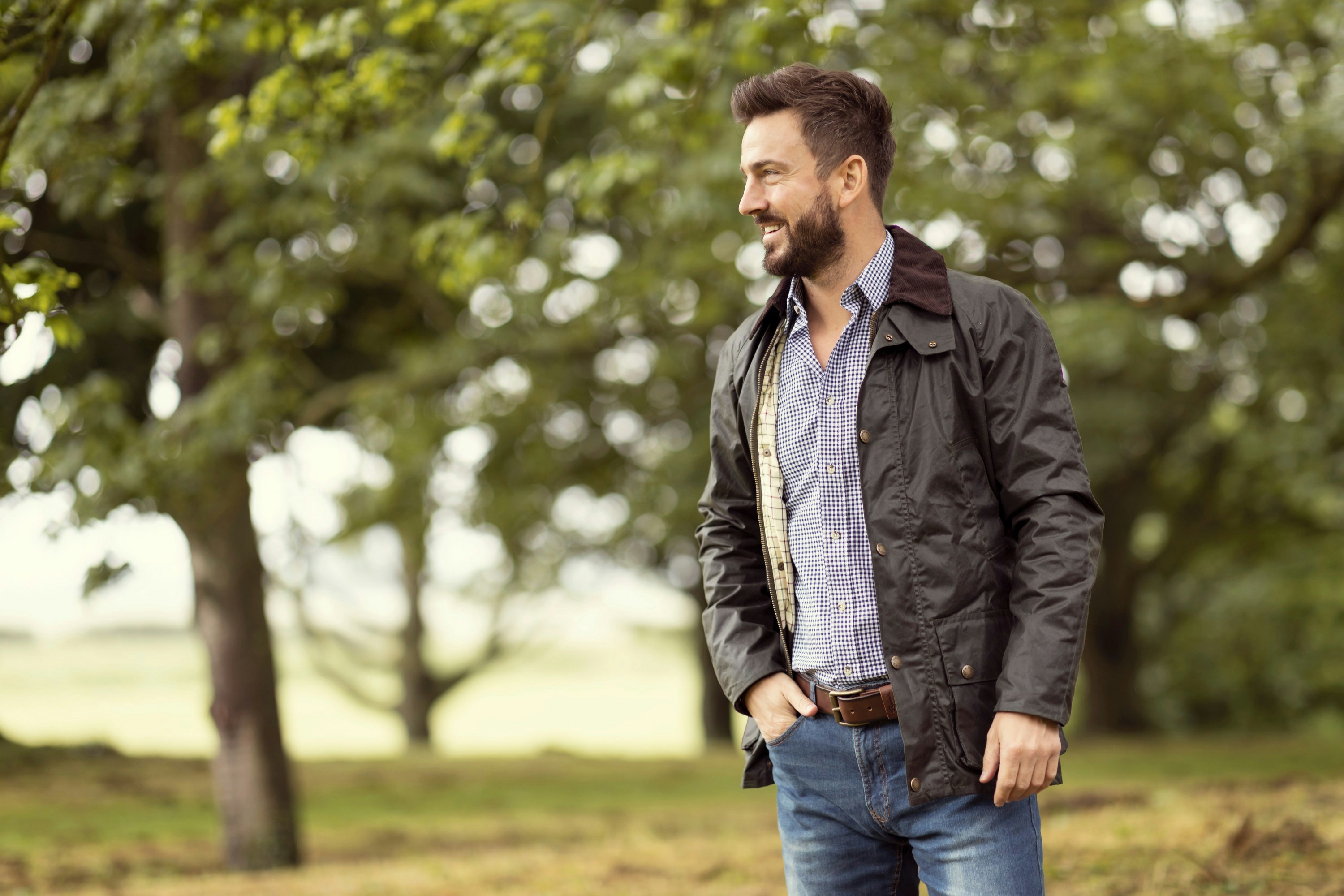 Casual confidence under a leafy canopy