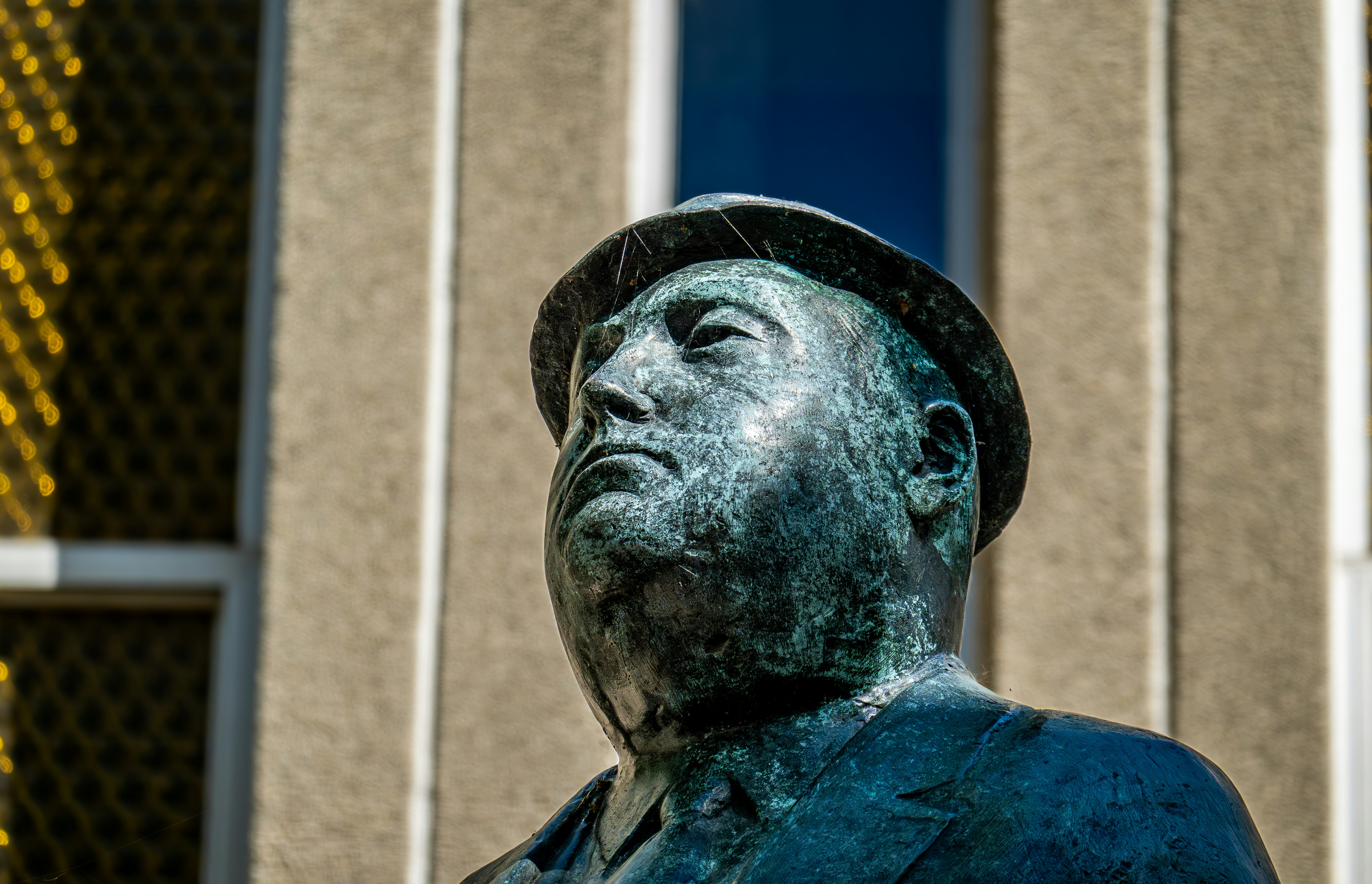 statue of a man with a hat