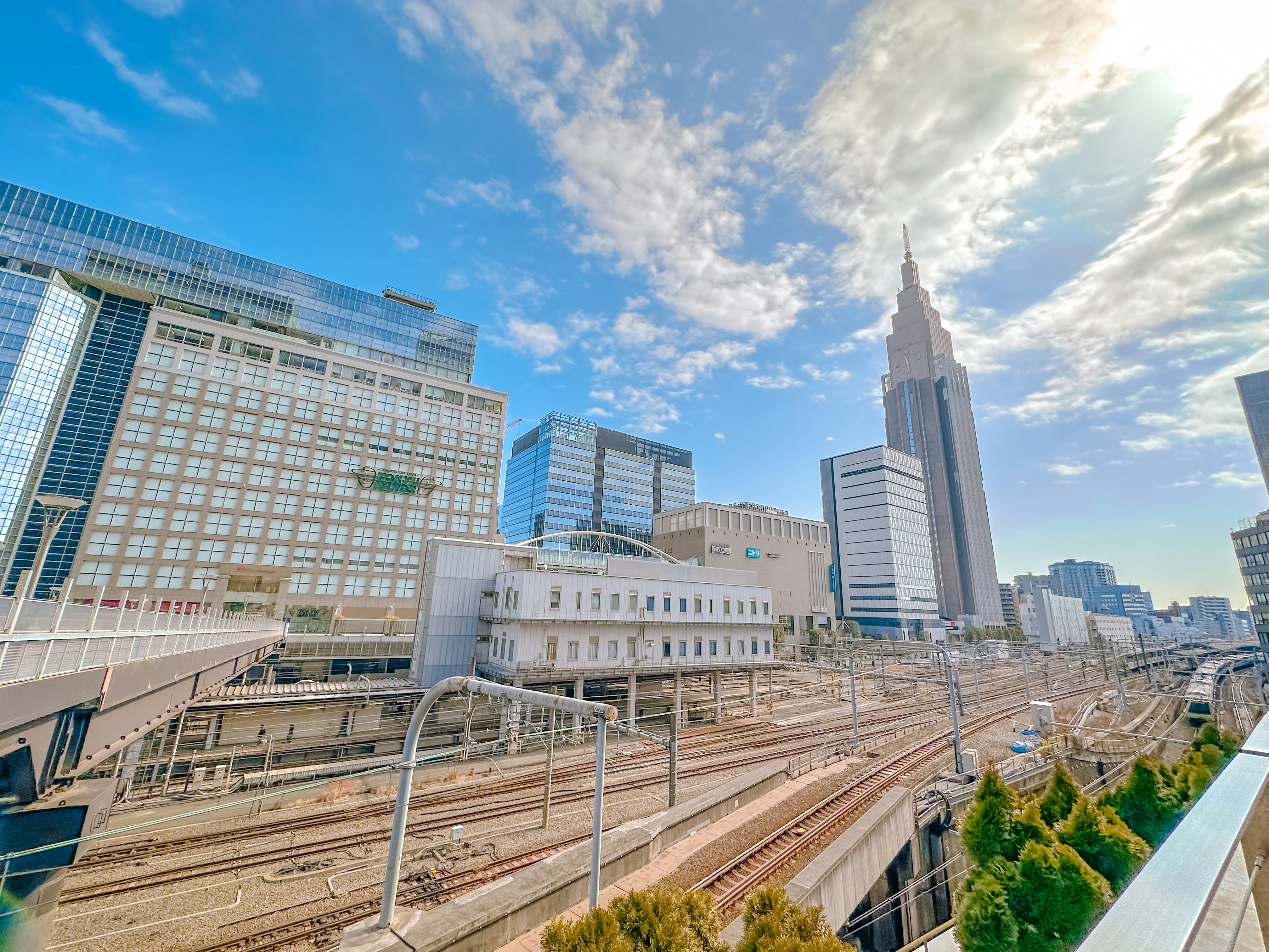 A panoramic view of a train track and buildings photo – Free Yoyogi ...