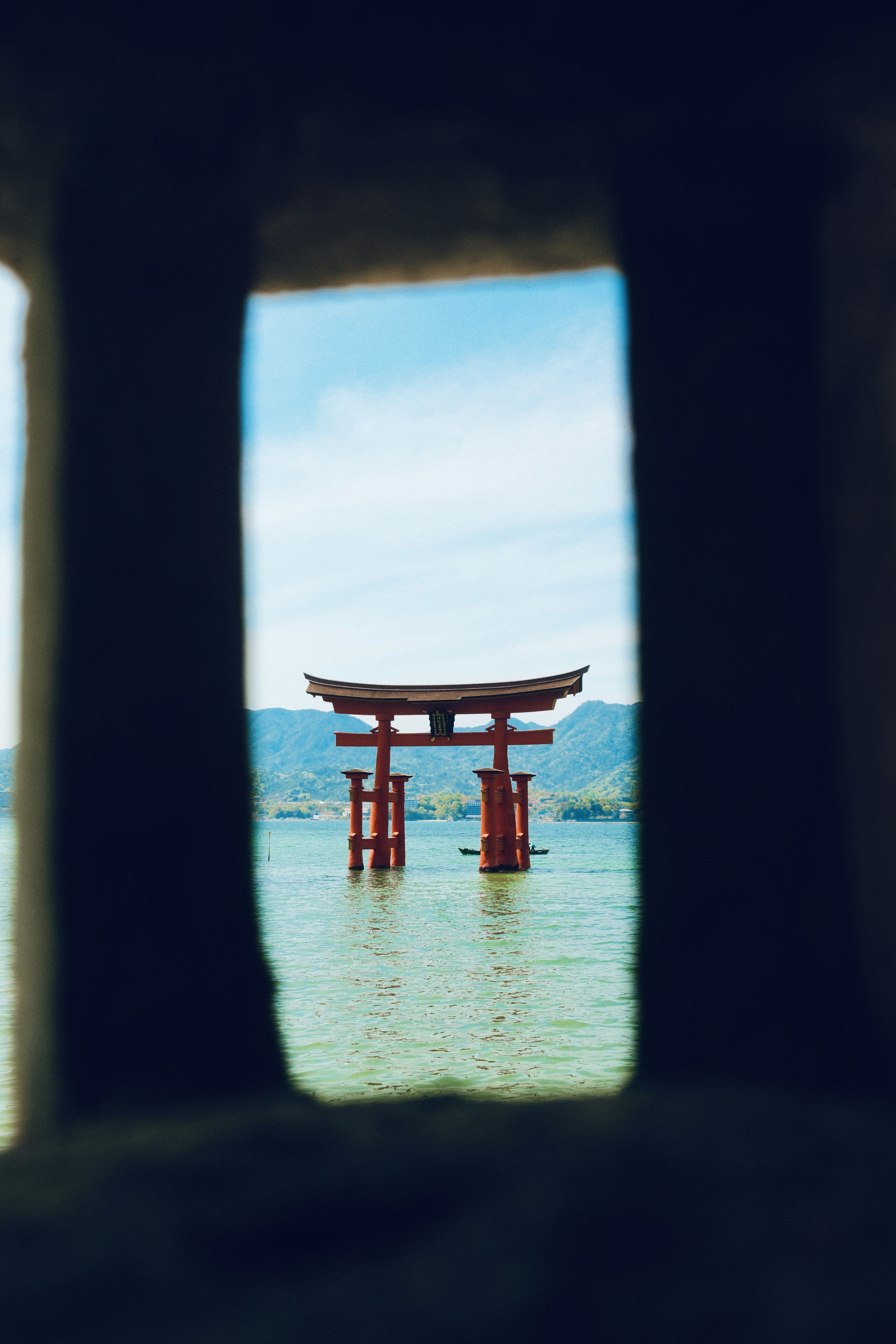 Red Gate, Blue Sea: Torii Framed by a Seaside Window