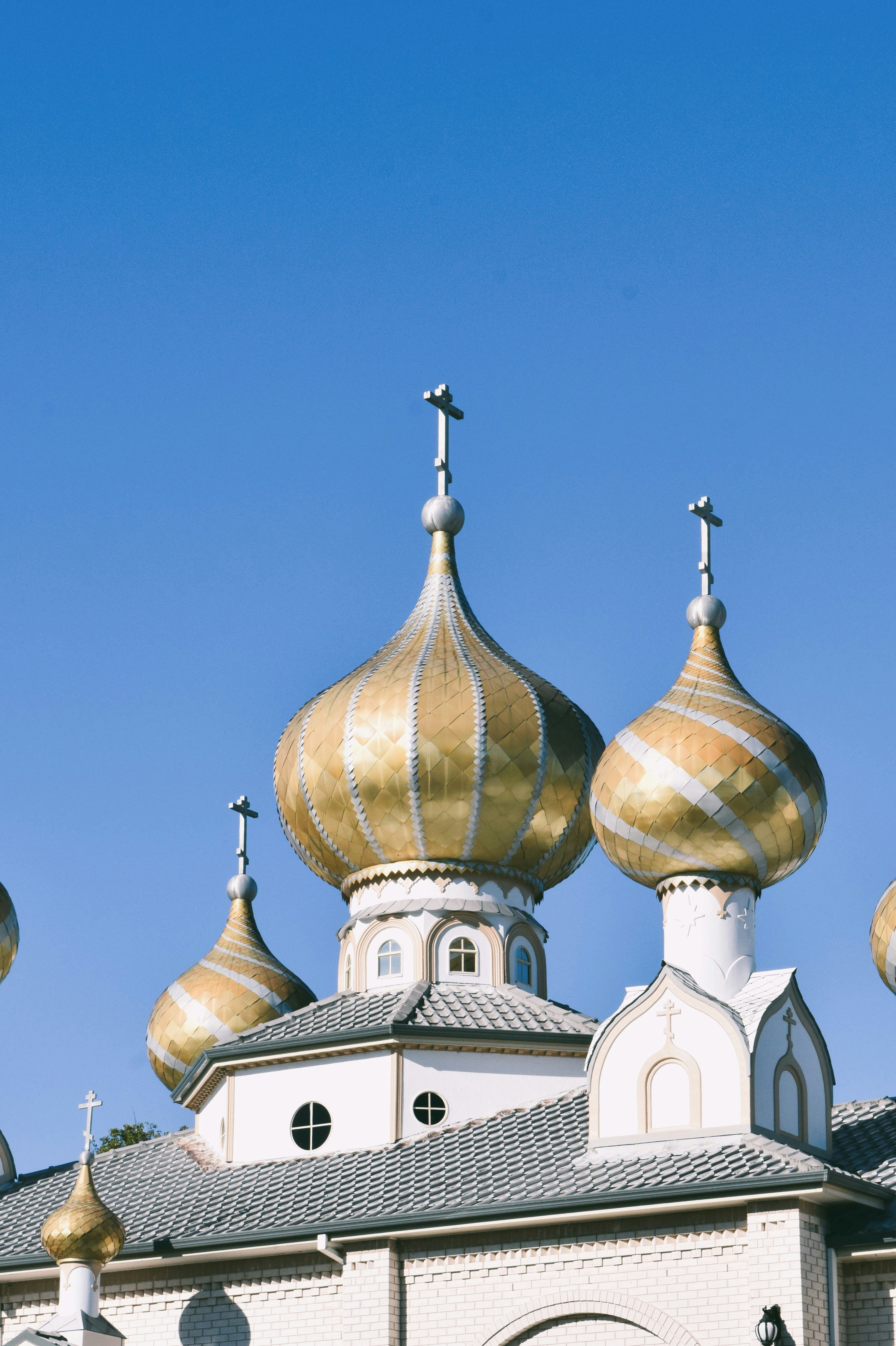 A white and gold church with gold domes photo – Free Orthodox church ...