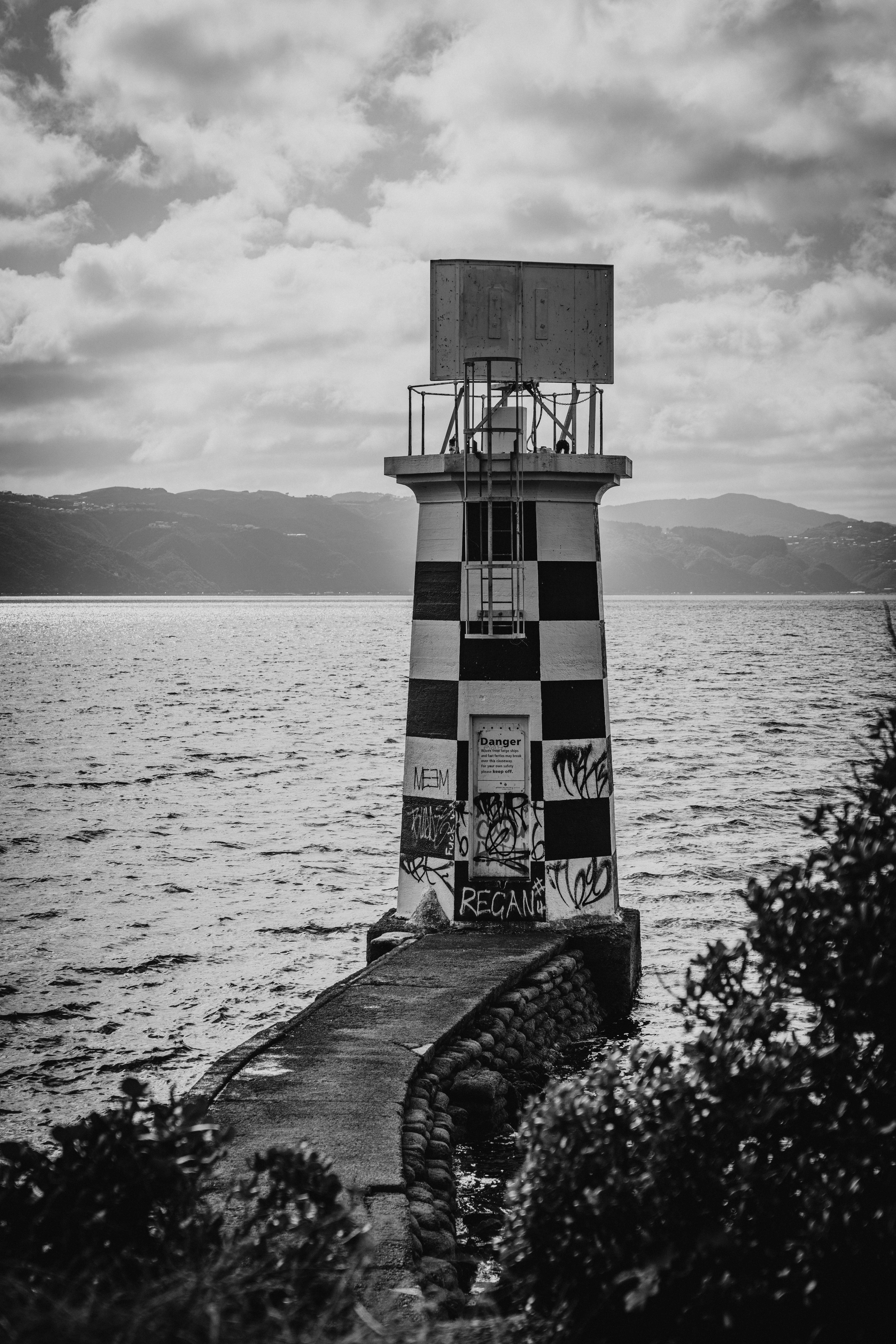 Simple and small lighthouse on the coast of Wellington New Zealand