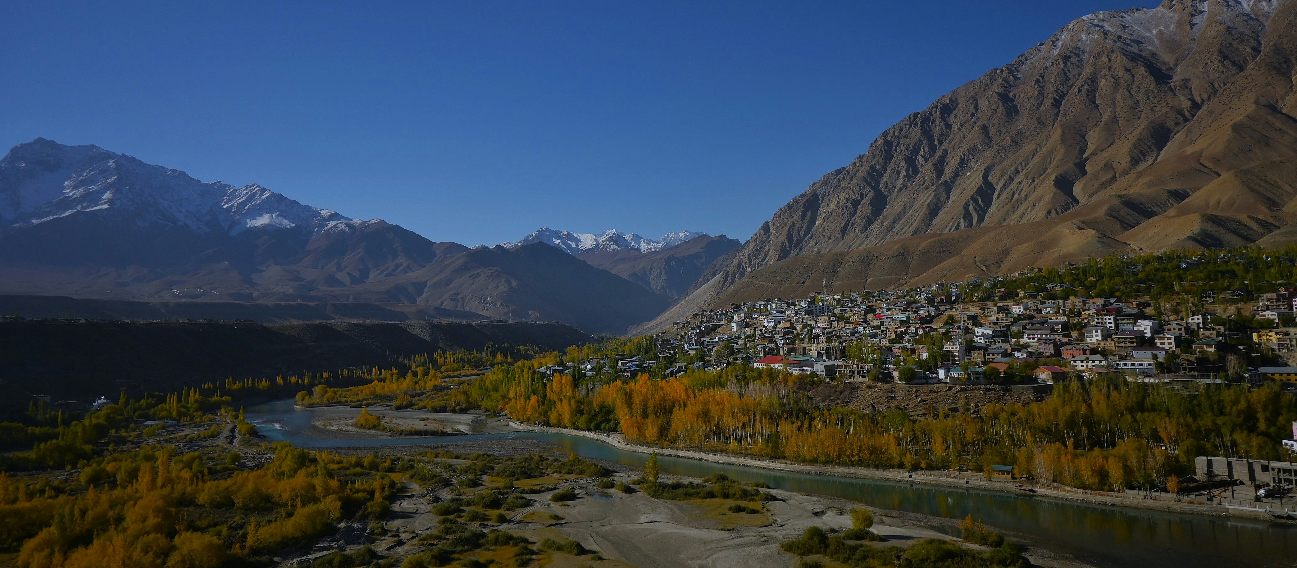 An aerial view of a town in the mountains photo – Free Kargil Image on ...