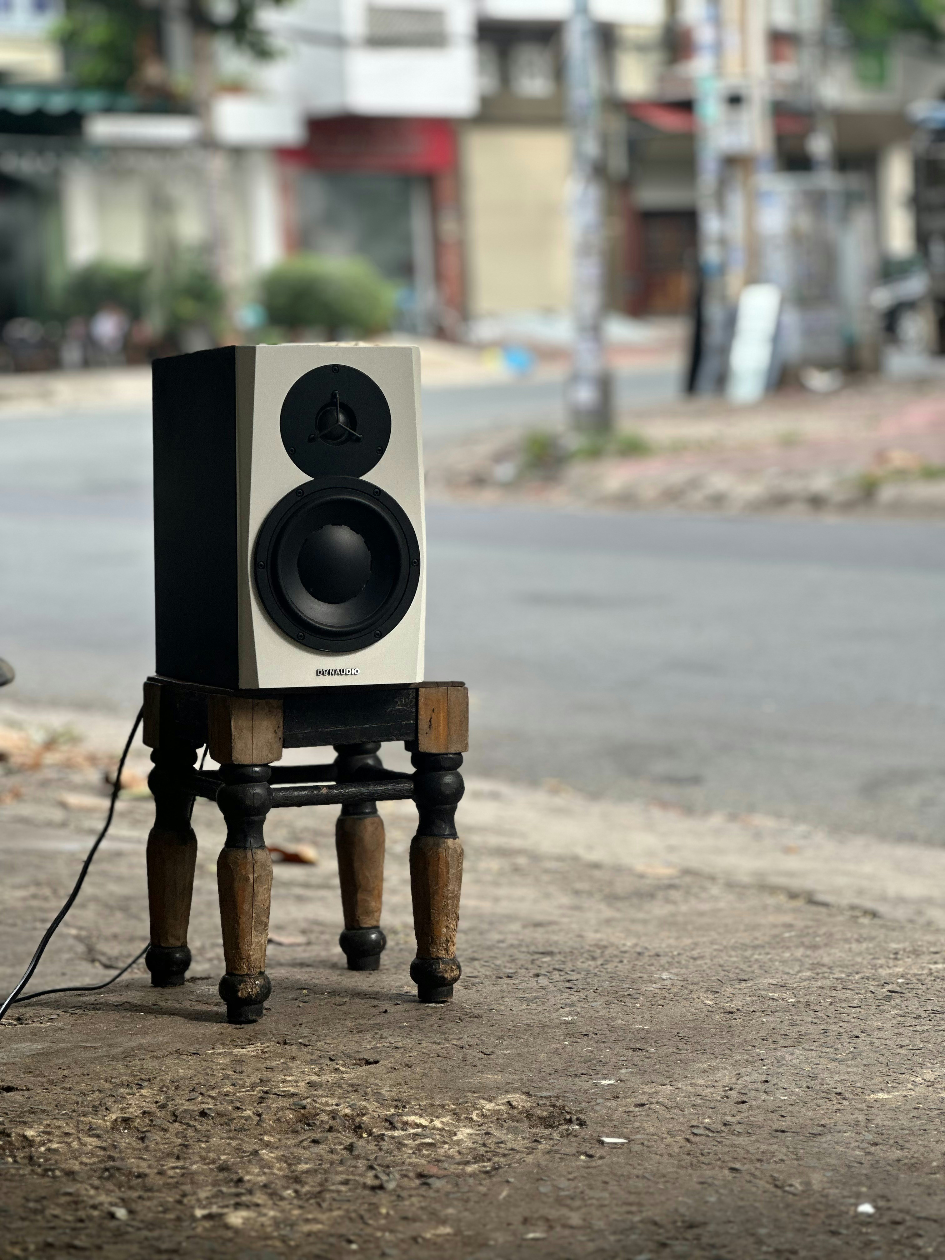 Speaker on a Weathered Stool: Streetcorner Soundstage