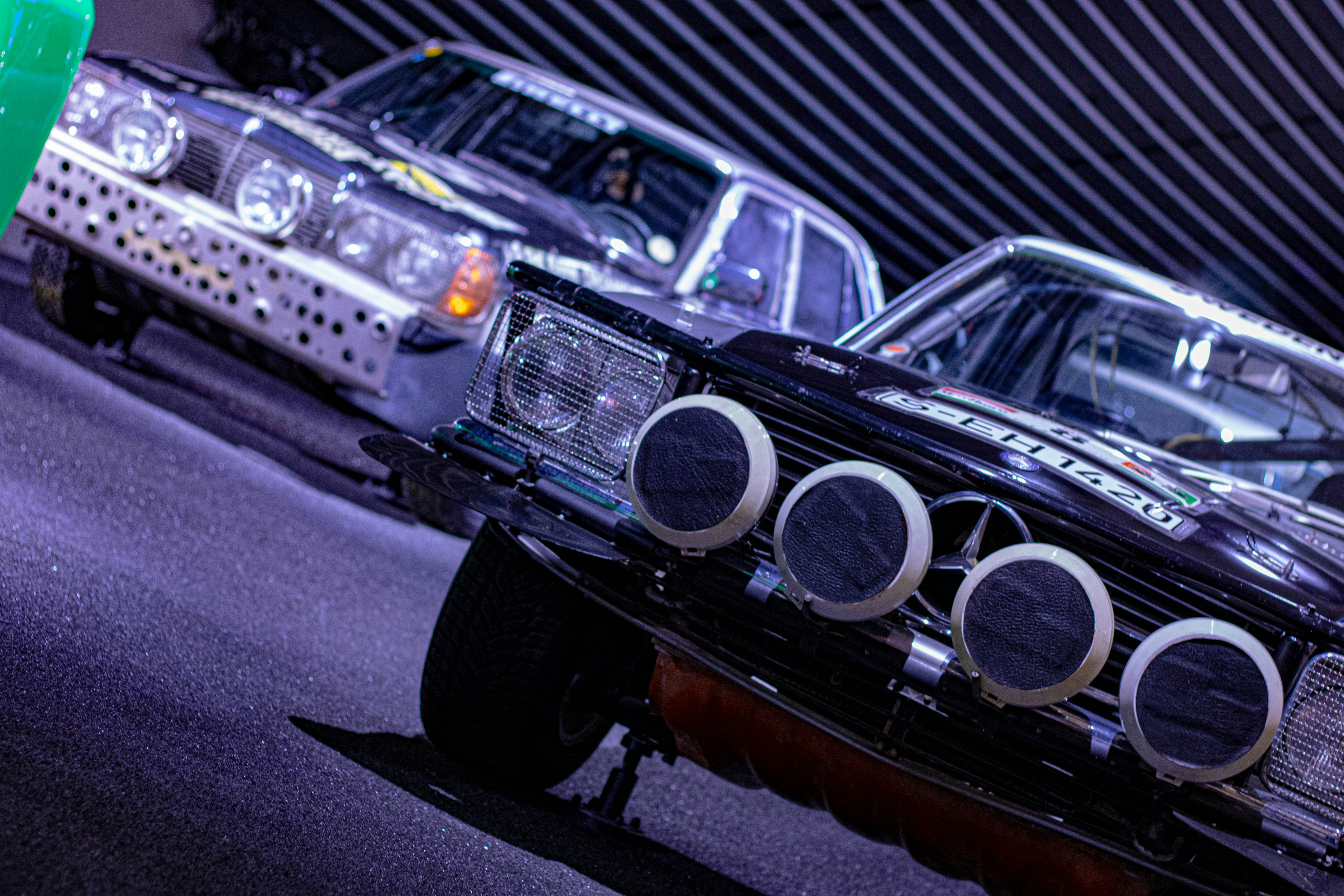 A group of cars parked next to each other photo – Free Car Image on ...